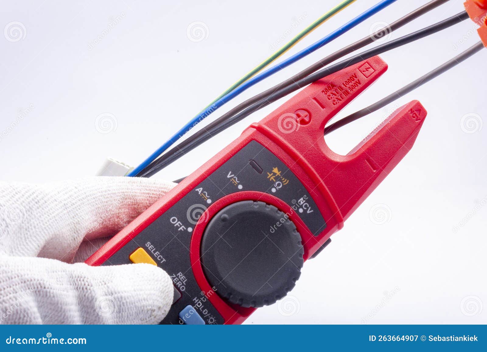 The Electrician Measures the Current in the Phase Wire with a Meter ...