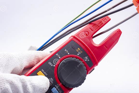 The Electrician Measures the Current in the Phase Wire with a Meter ...
