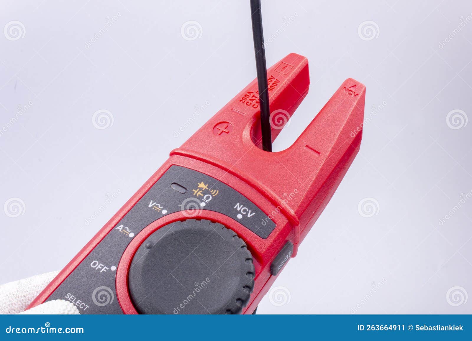 The Electrician Measures the Current in the Phase Wire with a Meter ...