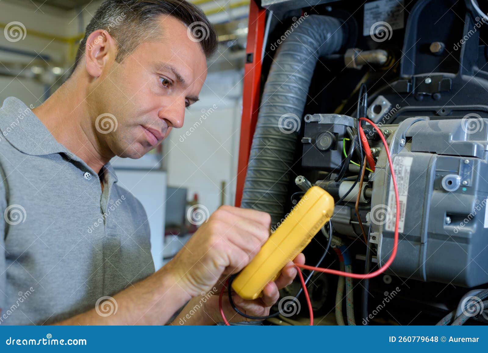 Electrician Measuring Voltage in Distribution Board Stock Photo - Image ...