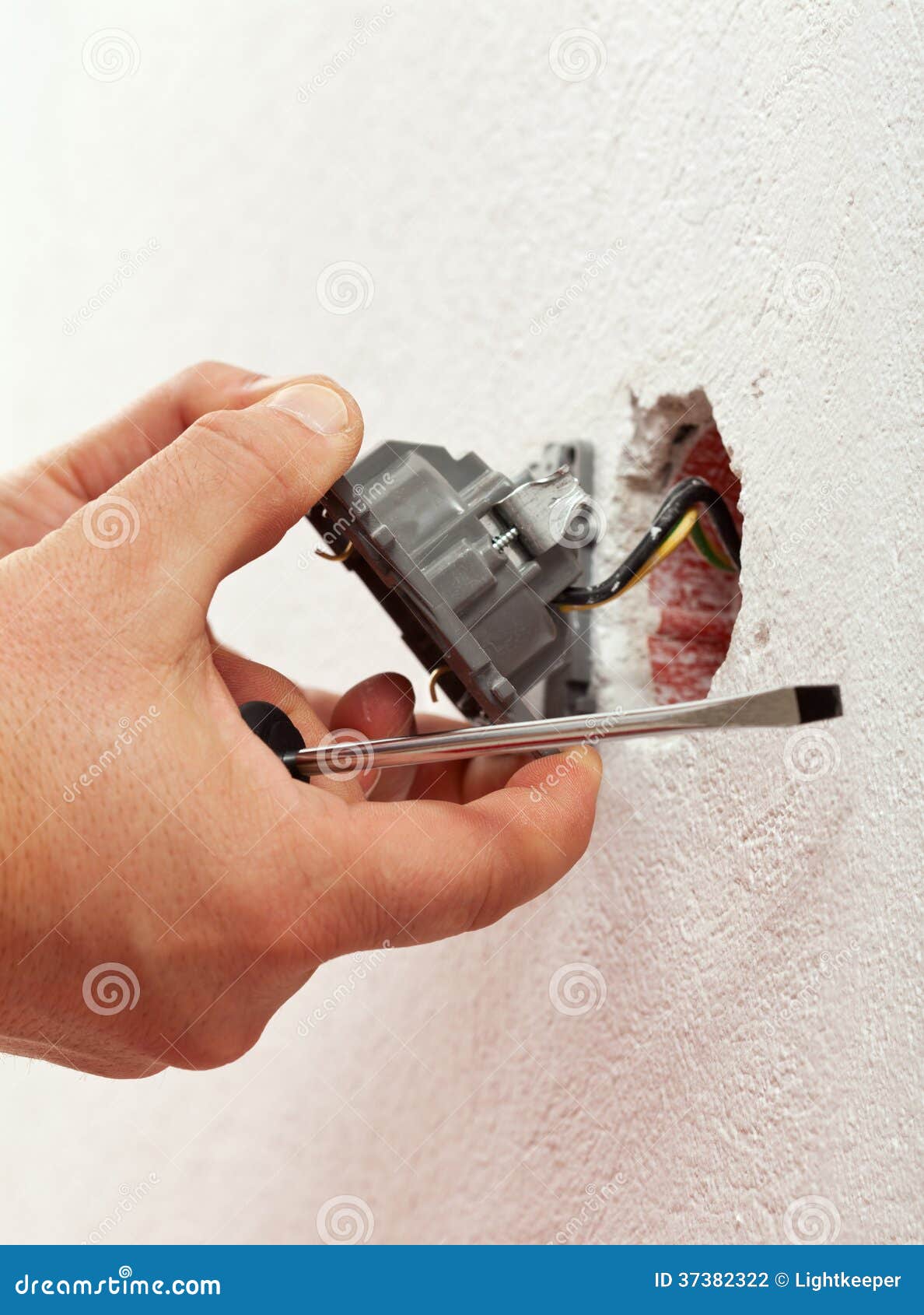 Electrician Mounting Electrical Wall Fixture Stock Photo - Image of ...