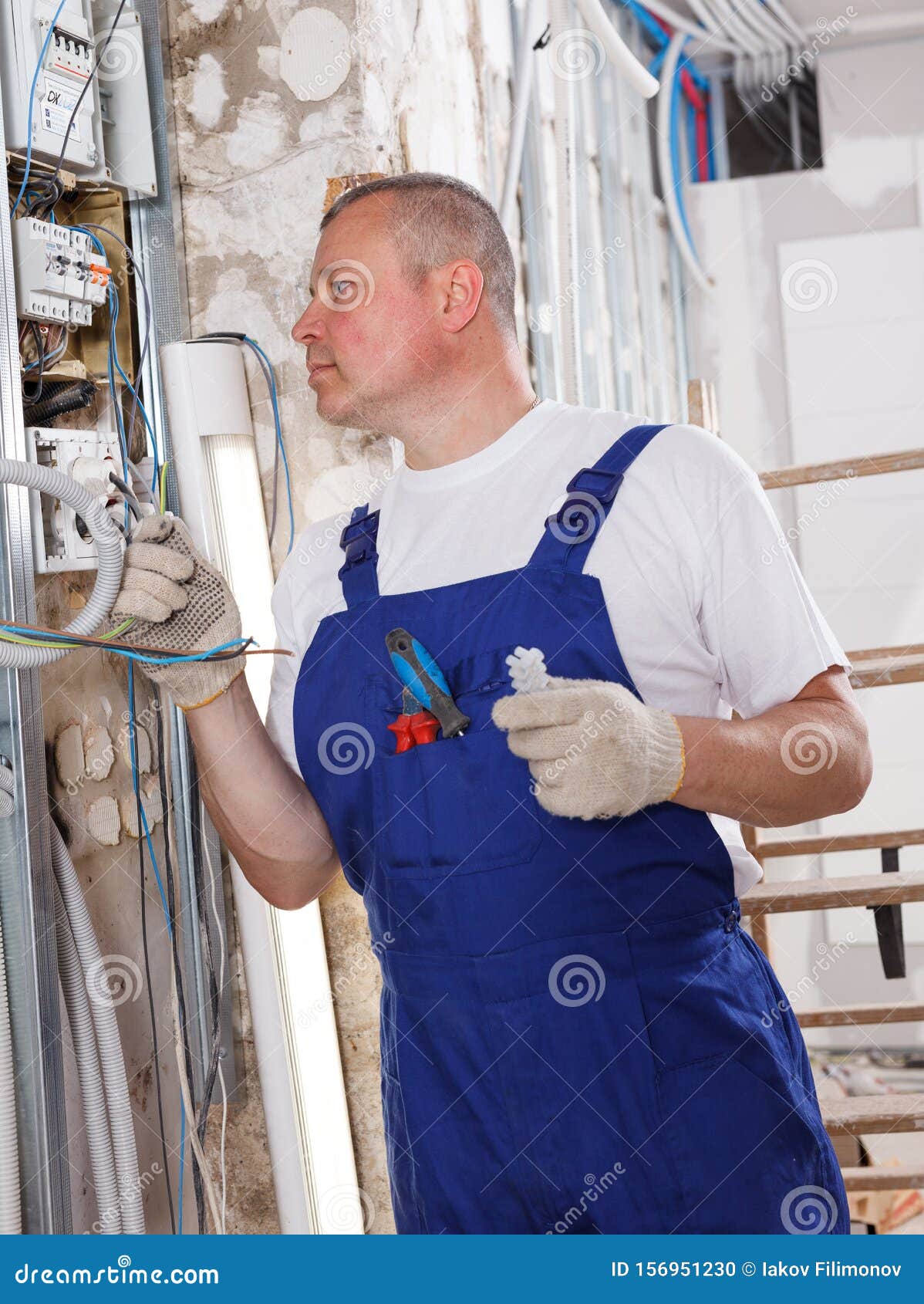 Electrician Mounting Electrical Wiring Stock Photo - Image of ...