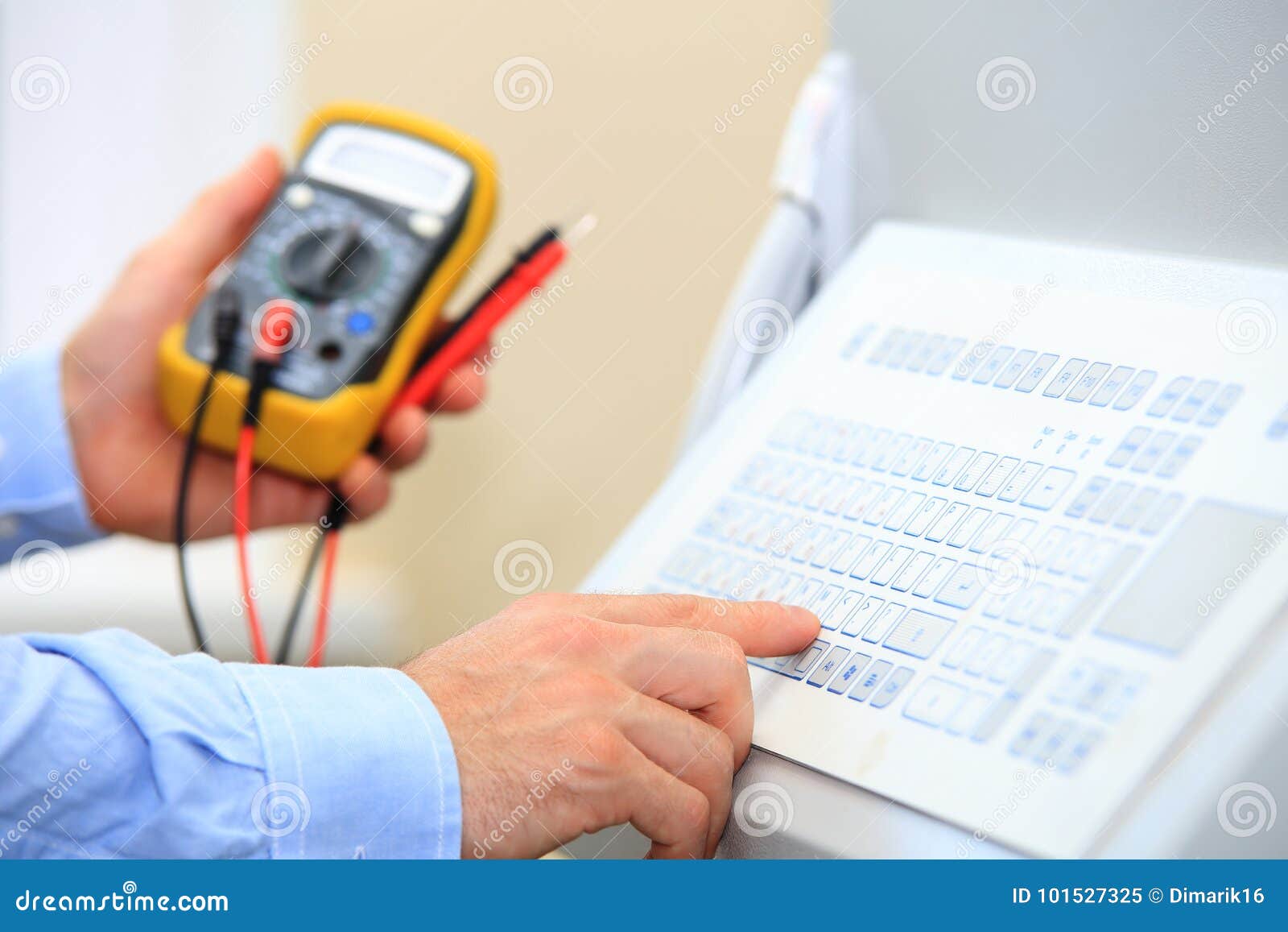 Electrician with Multimeter Using Industrial Keypad Stock Image - Image ...