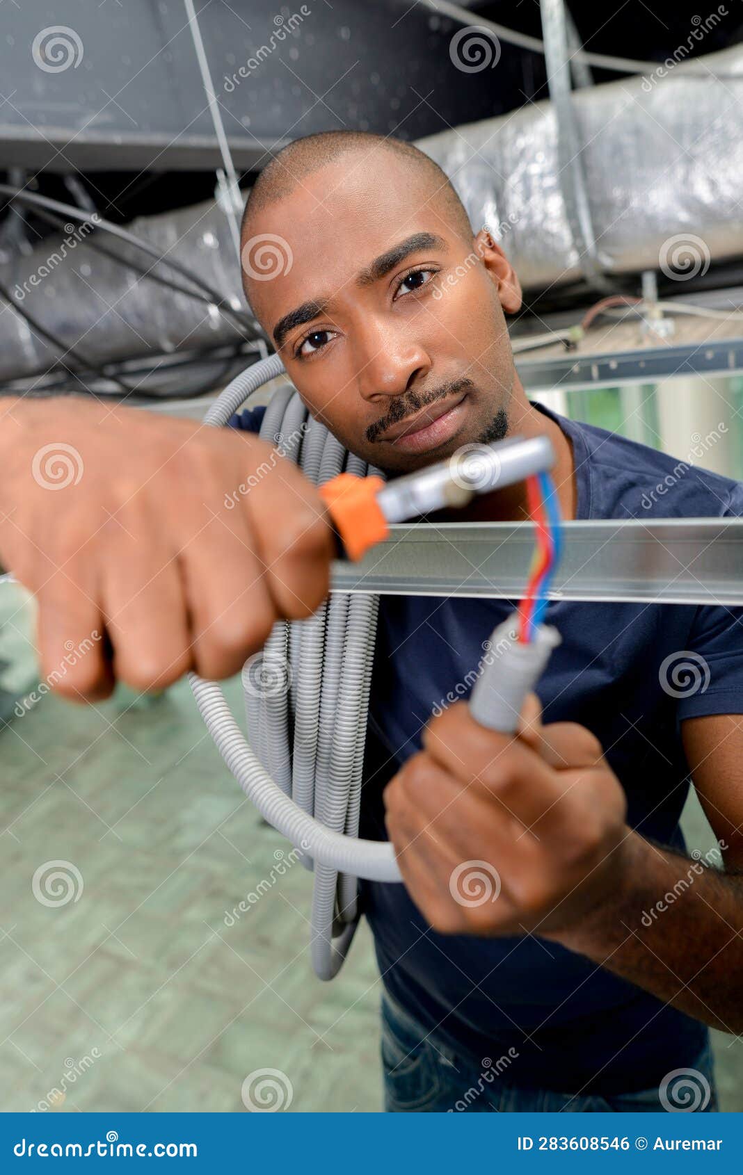 Electrician with Pliers at Work Stock Photo - Image of fixing, coating ...