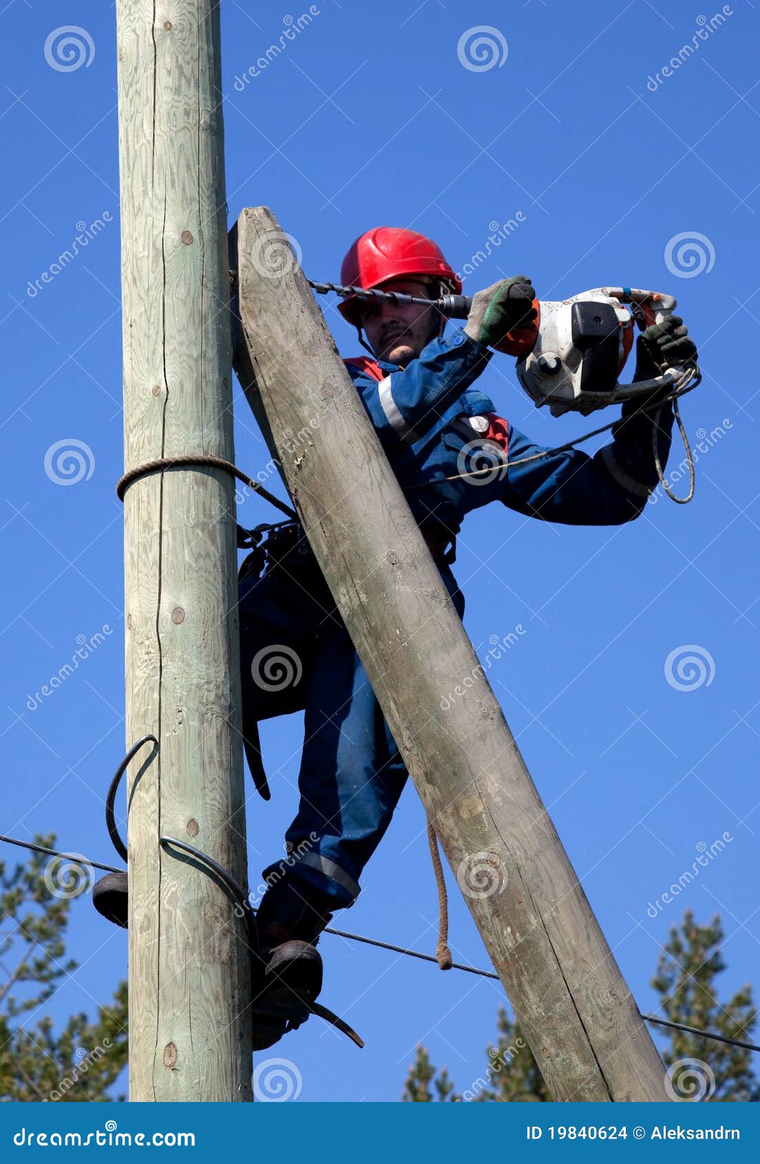 Electrician on a Pole Makes Installation Work Stock Photo - Image of ...