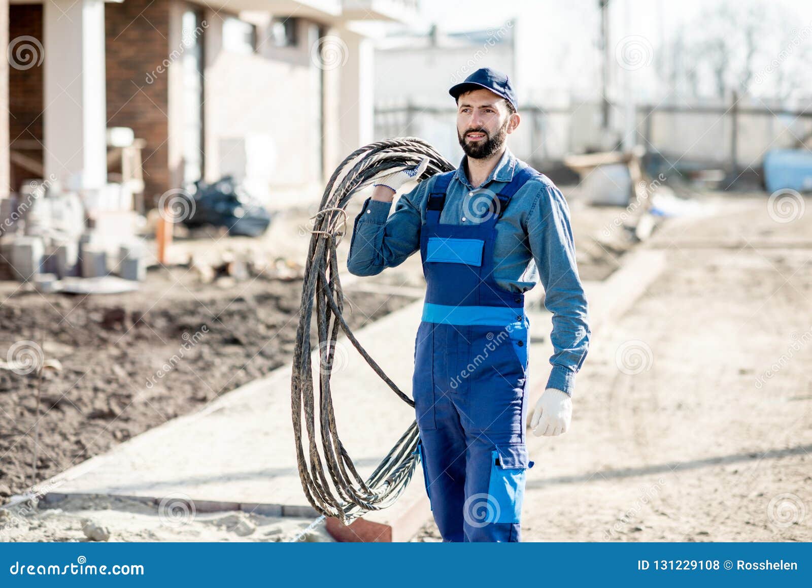 Electrician Portrait with Power Cable Stock Photo - Image of services ...