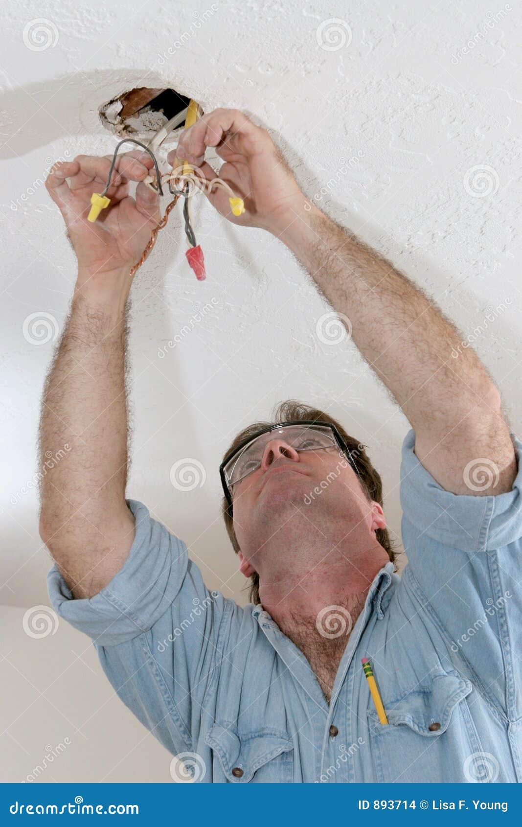 Industrial Electrician Pulling Wire