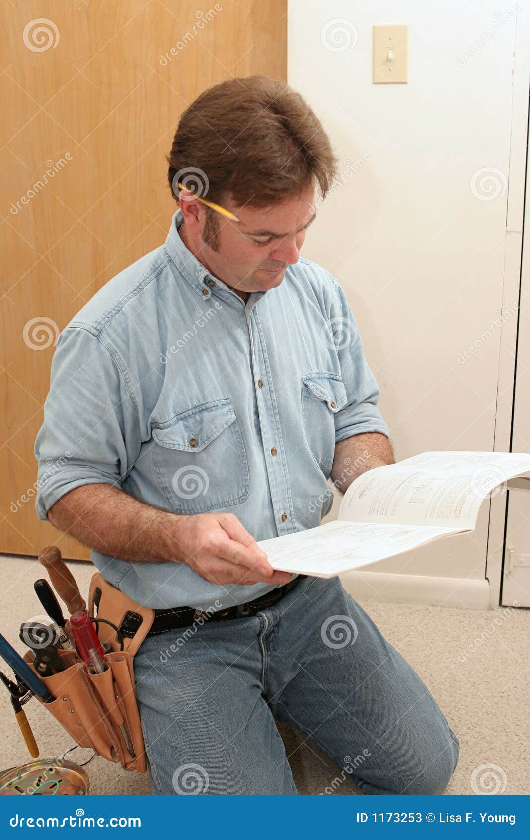 Electrician Reads the Manual Stock Image - Image of instructions ...