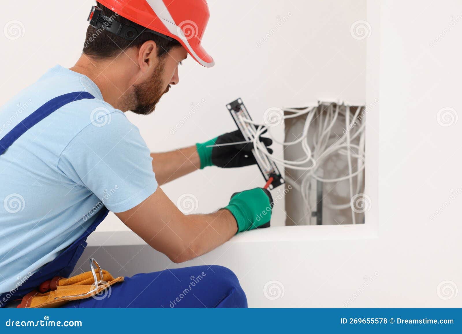 Electrician with Screwdriver Fixing Patch Panel Indoors Stock Photo ...