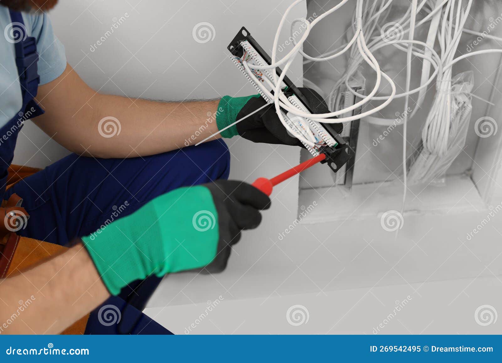 Electrician with Screwdriver Fixing Patch Panel Indoors, Closeup Stock ...