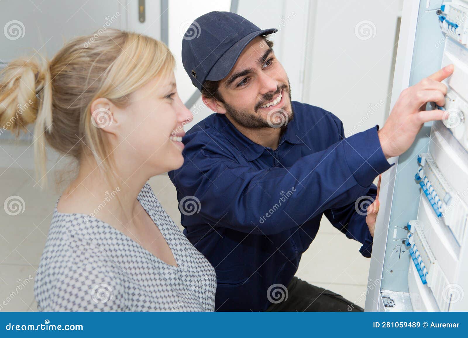 Electrician Showing Client Switches on Panel Stock Image - Image of ...