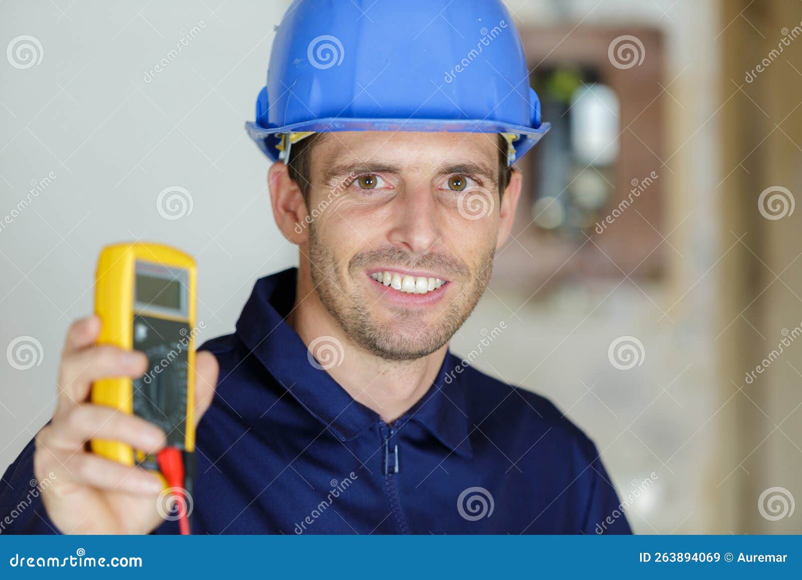 Electrician Showing Machine To Measure Electrical Current Stock Image ...