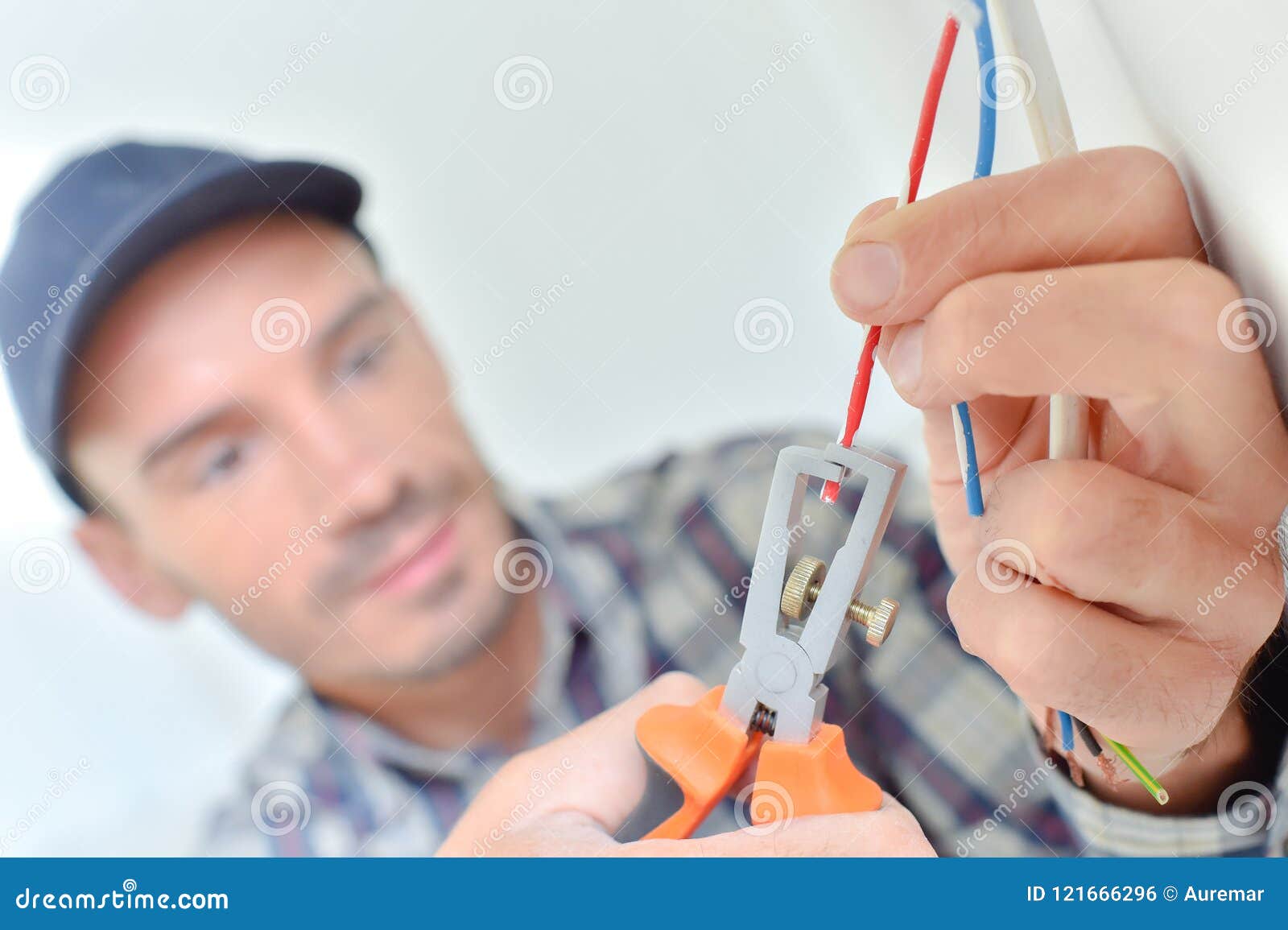Electrician Snipping a Wire Stock Photo - Image of skill, maintenance ...