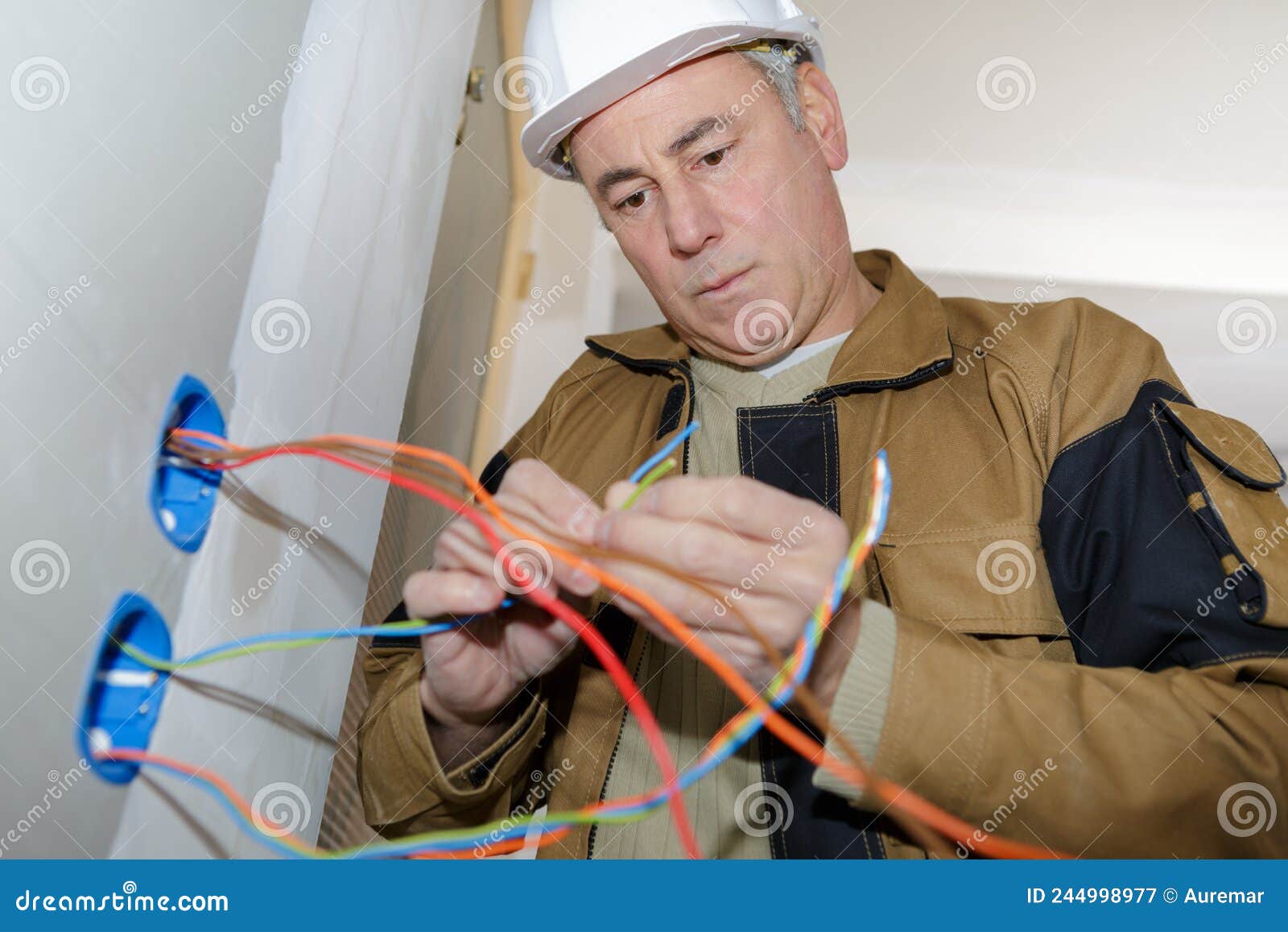 Electrician Sorting Wires on Wall Stock Image - Image of repair ...