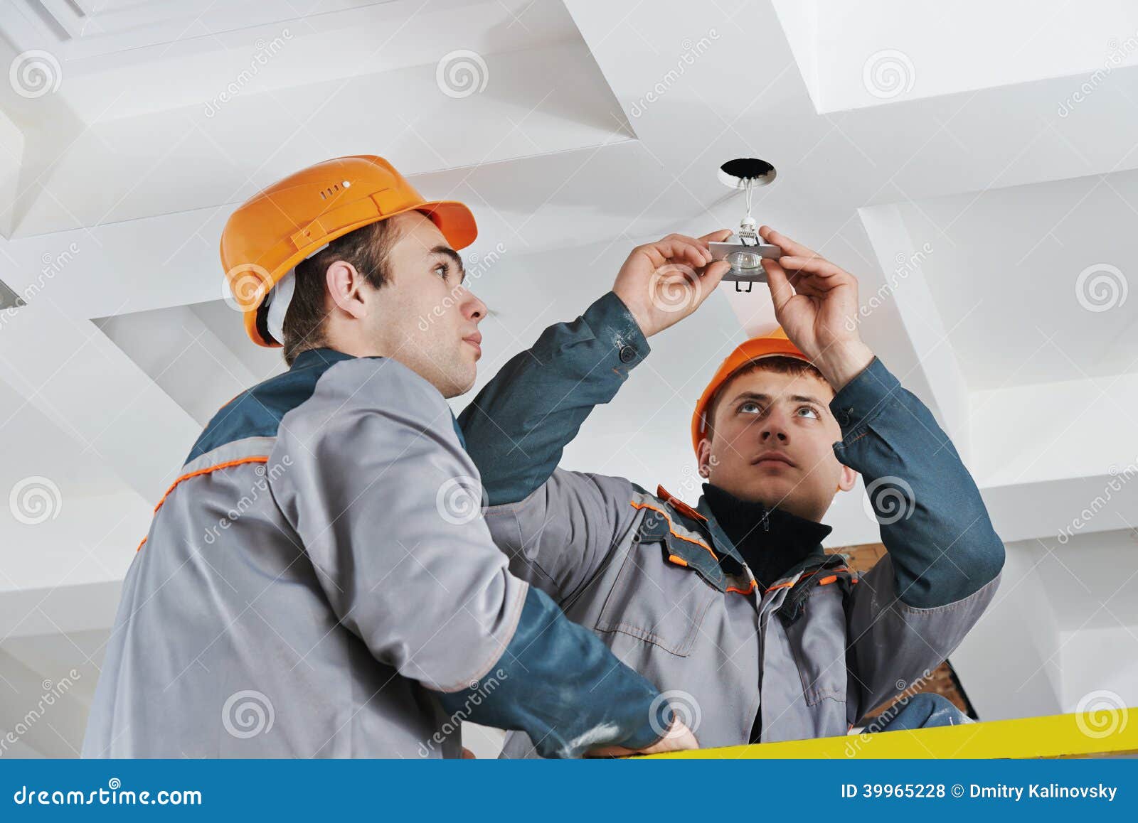 Electrician at Spot Light Installation Stock Photo - Image of current ...