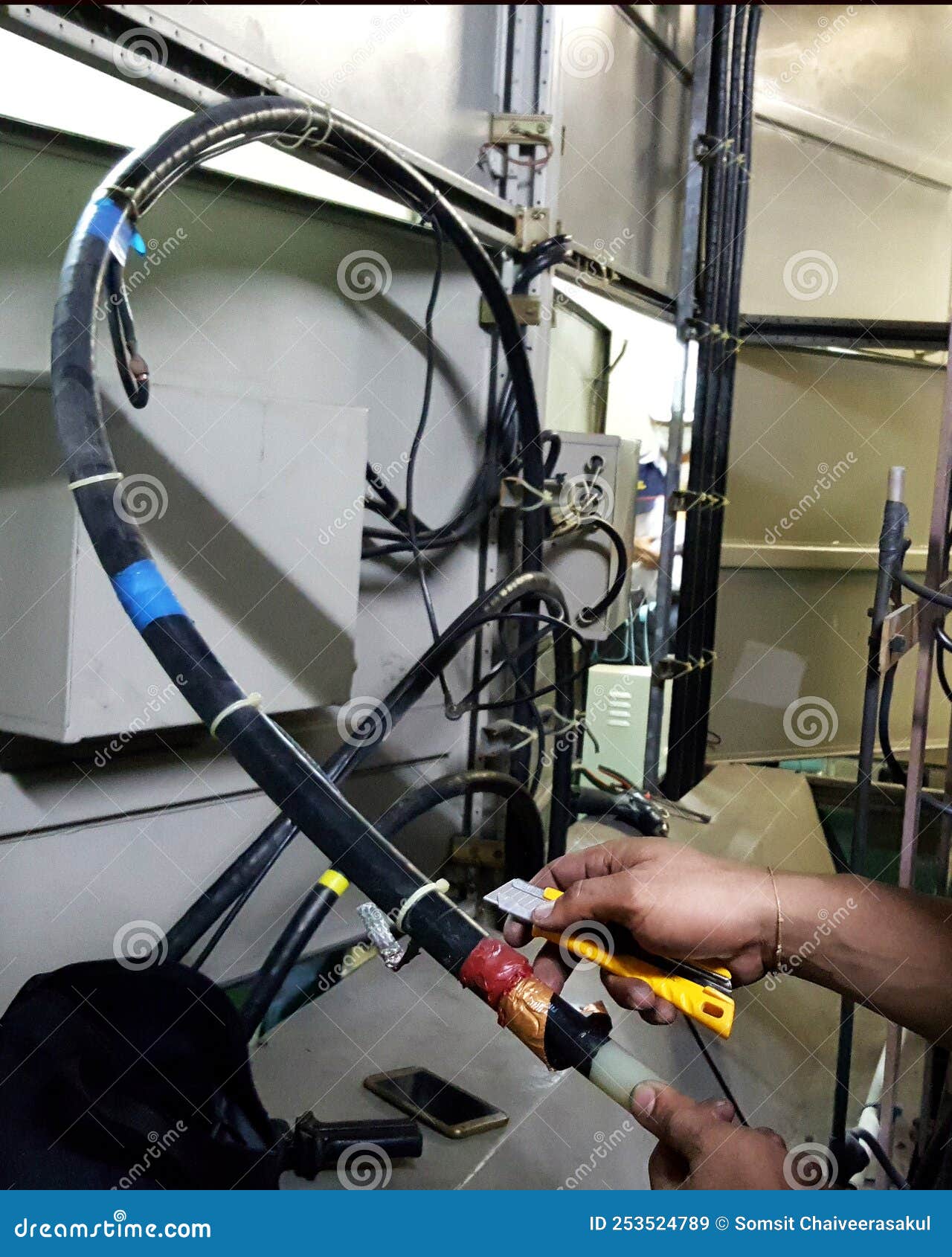 Electrician Stripping of Medium Voltage Power Cable Stock Image - Image ...