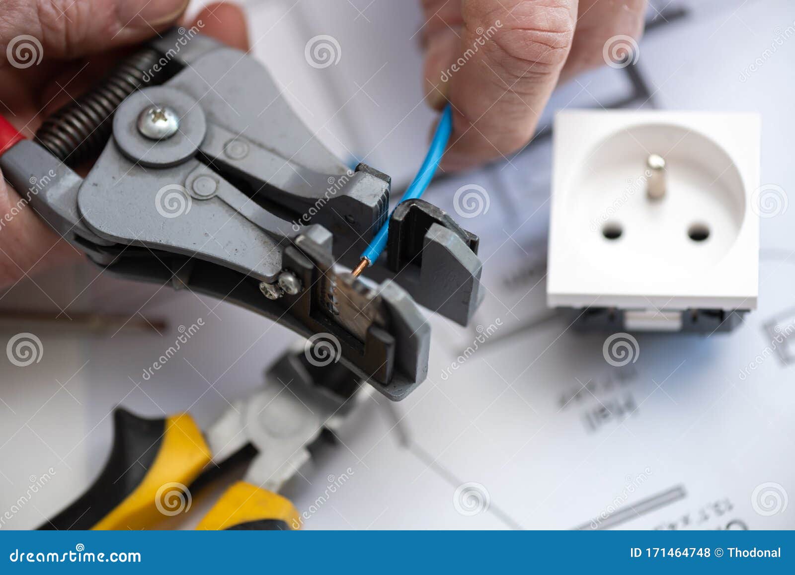 Electrician Stripping a Wire Stock Photo - Image of handyman, wire ...