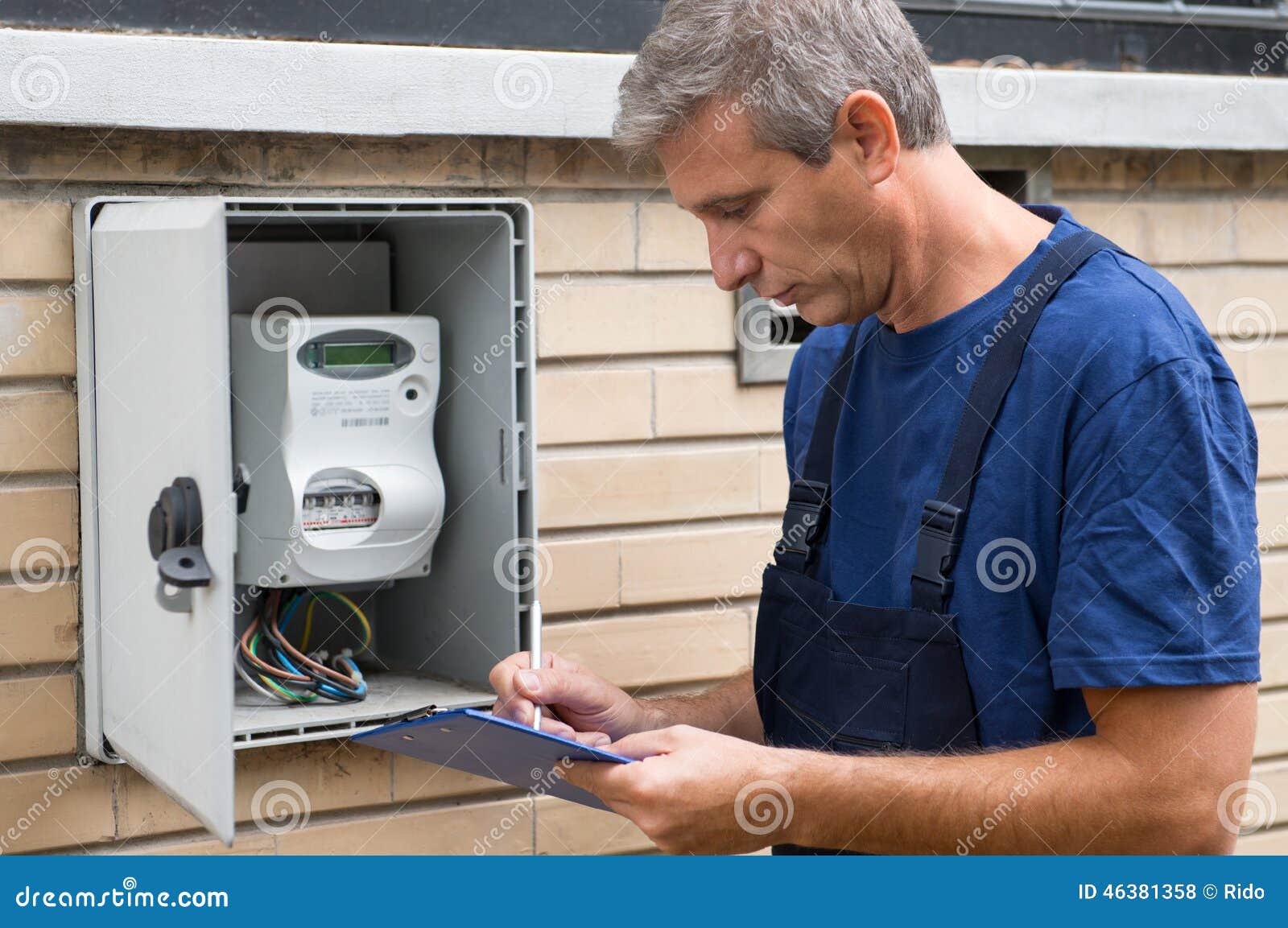 Electrician Taking Meter Readings Stock Photo - Image of industrial ...