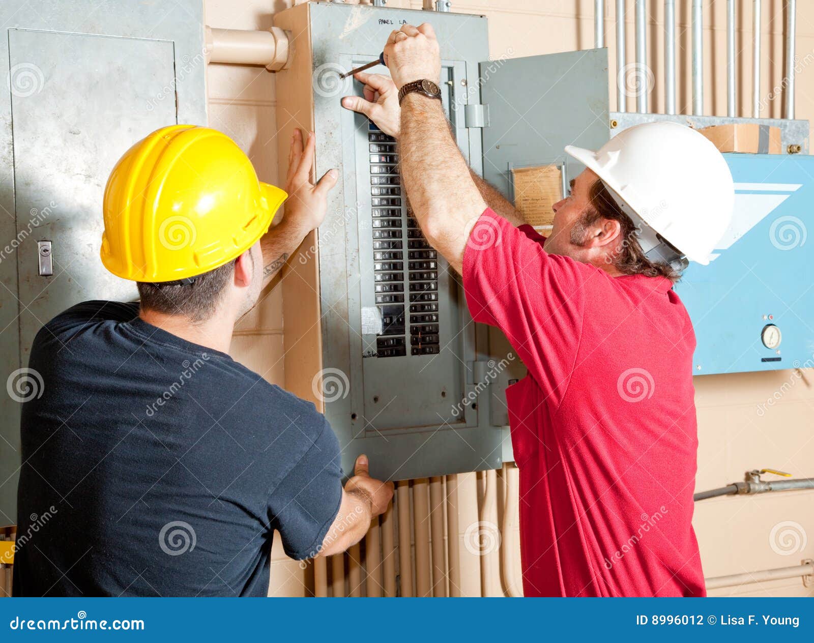 Electrician Teamwork stock photo. Image of mechanical - 8996012