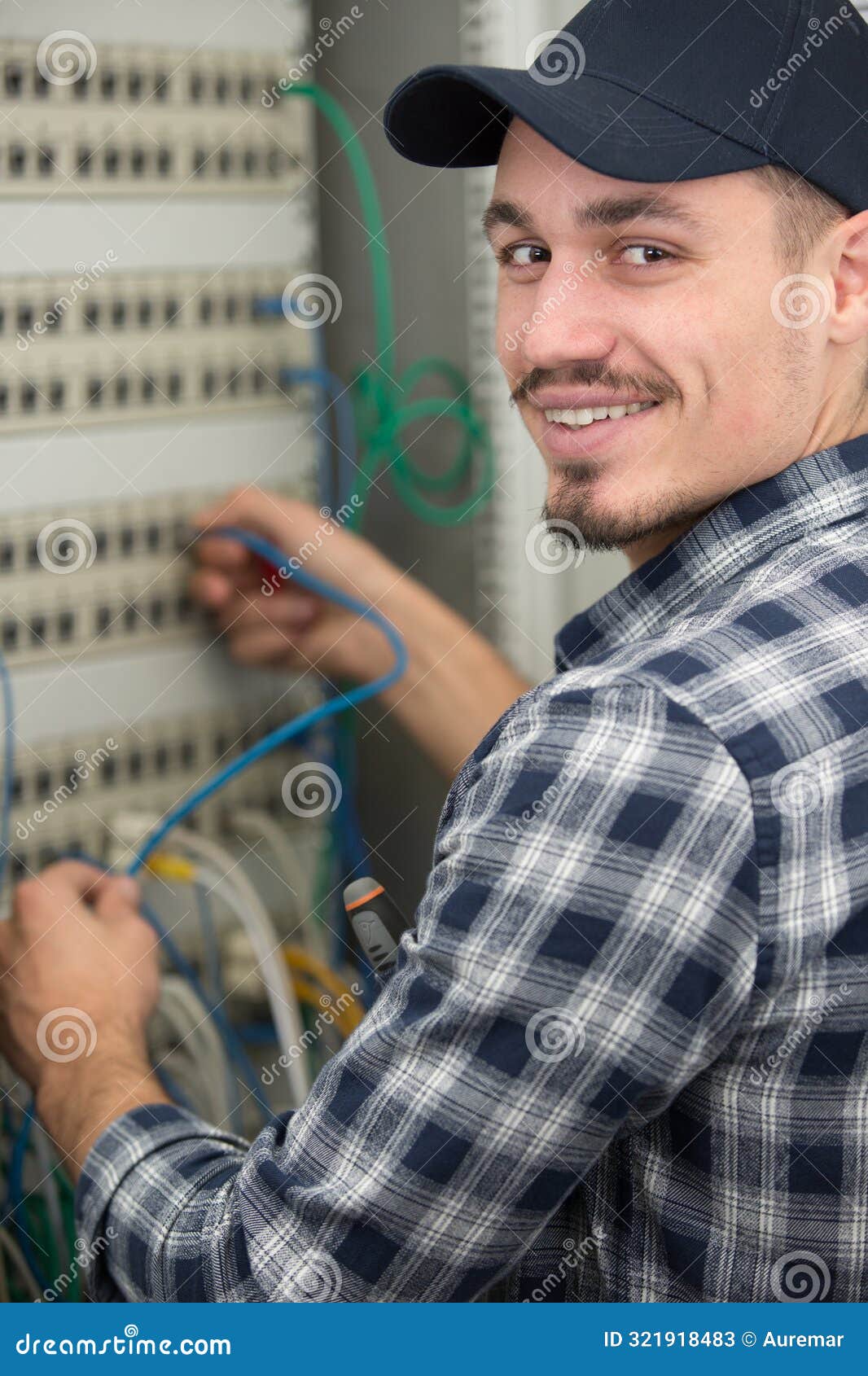 Electrician Technician Works with Cable Residential Electrical Panel ...