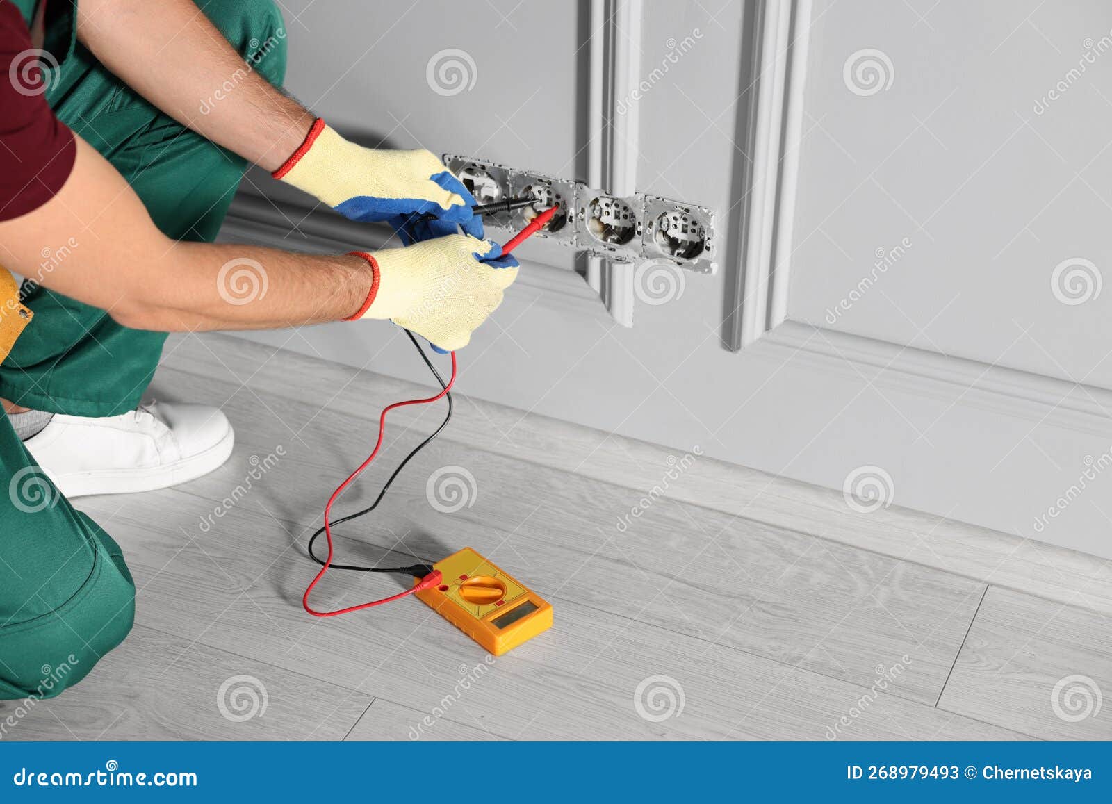 Electrician with Tester Checking Voltage Indoors, Closeup Stock Image ...