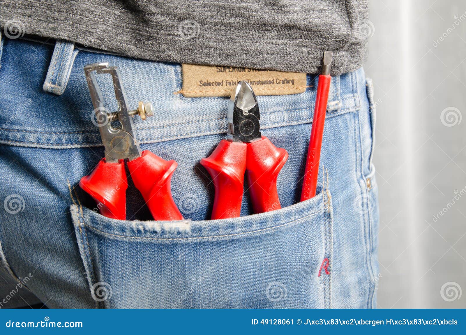 Electrician Tools in Back Pocket Stock Image - Image of pliers ...