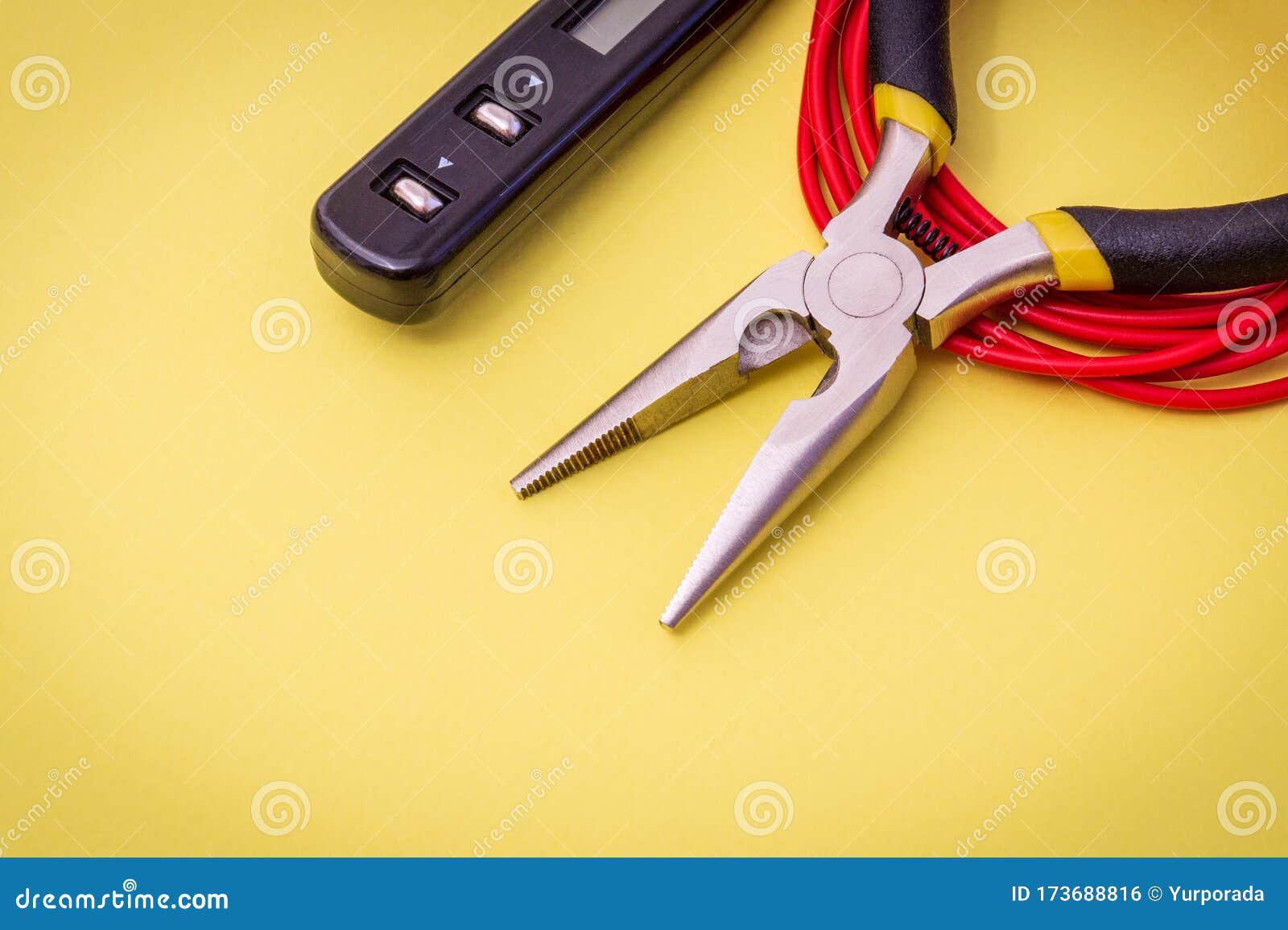 Electrician Tools and Wire on Yellow Background for Repairing Energized ...