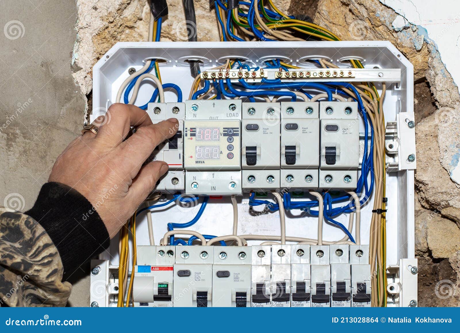 The Electrician Turns Off the Input Automatic Toggle Switch of the ...