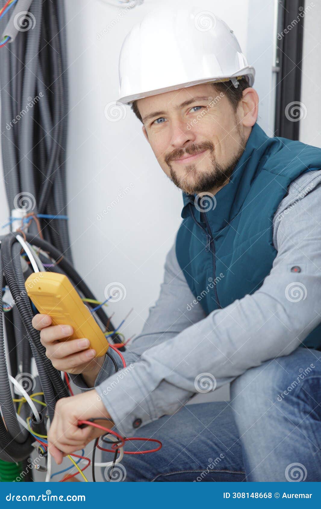Electrician Using Multimeter in Renovation Property Stock Photo - Image ...