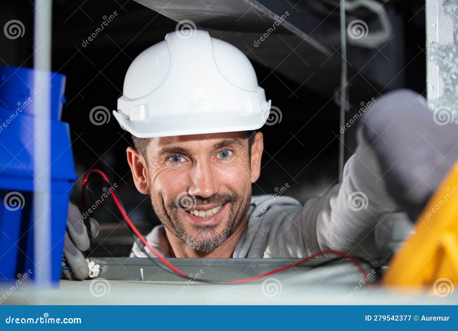 Electrician Using Multimeter in Roof Space Stock Image - Image of ...