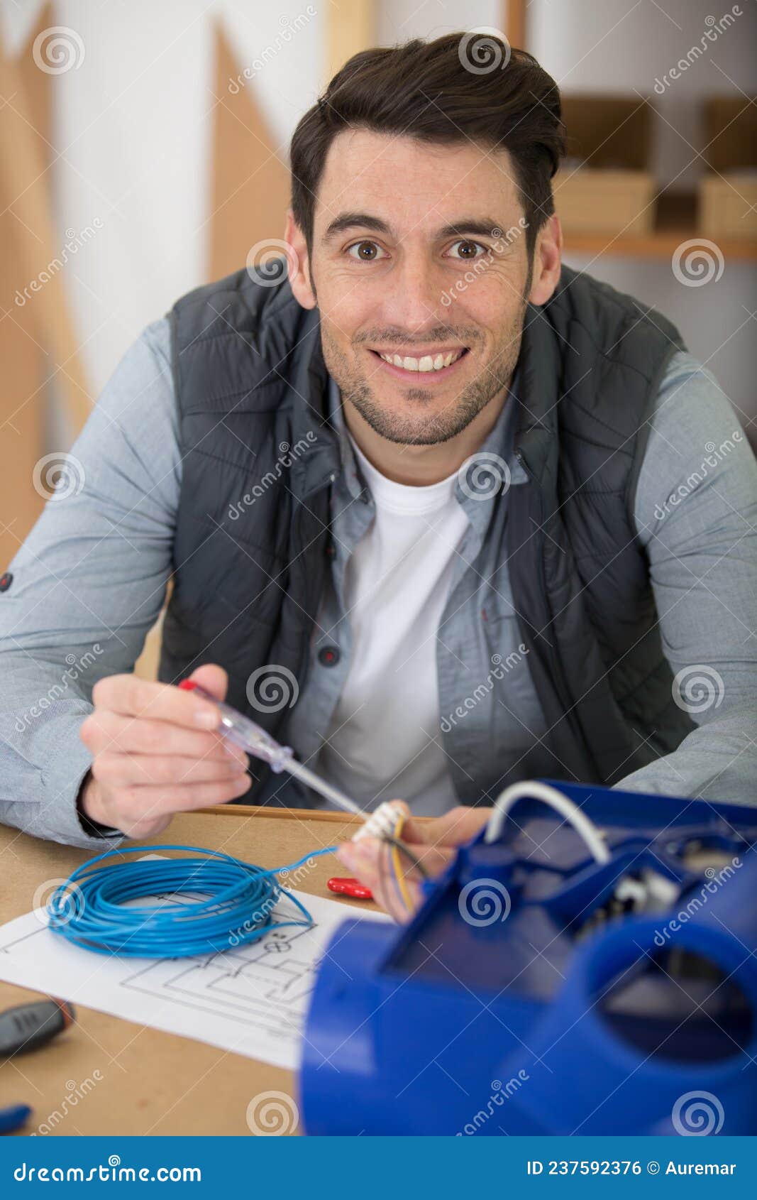 Electrician Using Screwdriver on Electrical Junction Box Stock Photo ...