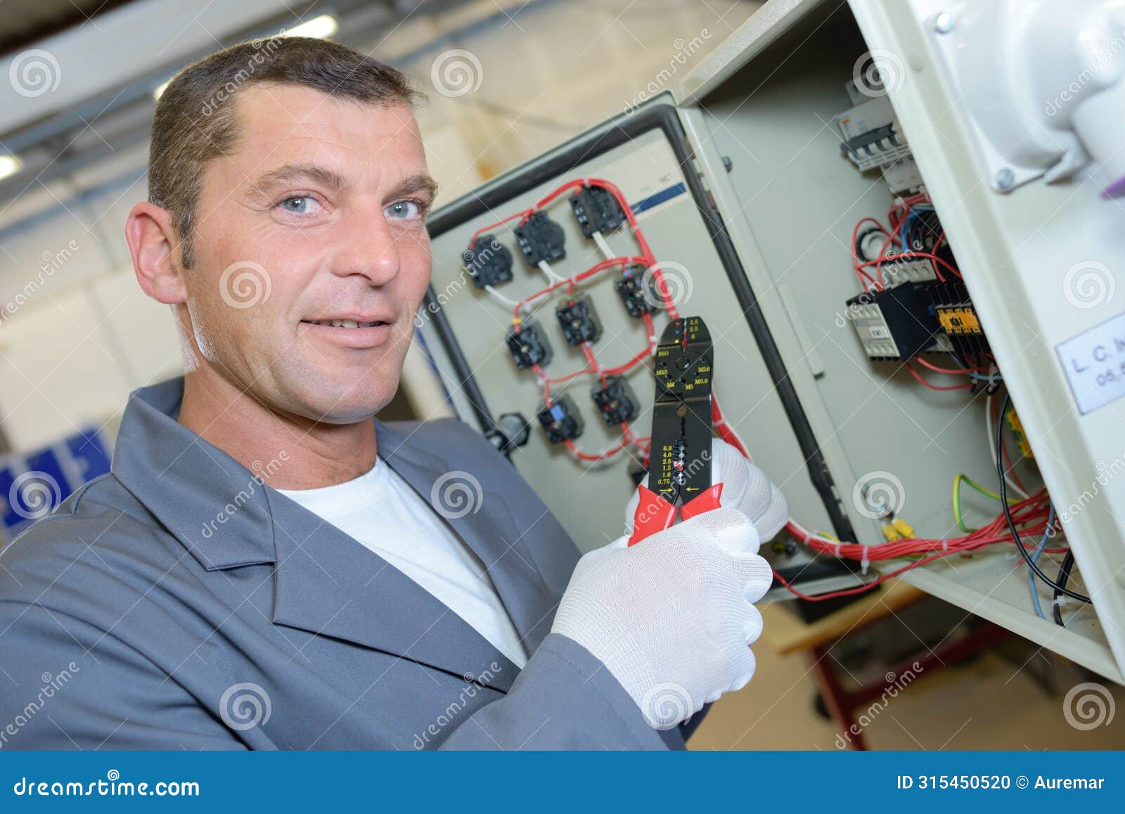 Electrician Using Wire Strippers Stock Photo - Image of compliance ...