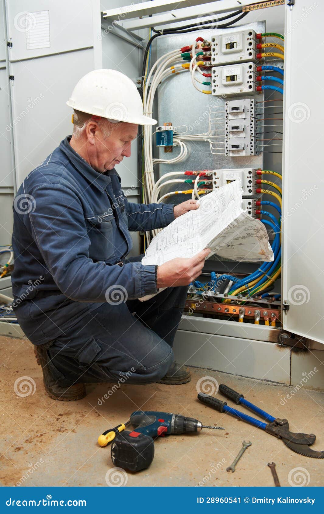 Electrician At Wiring With Working Drawings Royalty-Free Stock ...