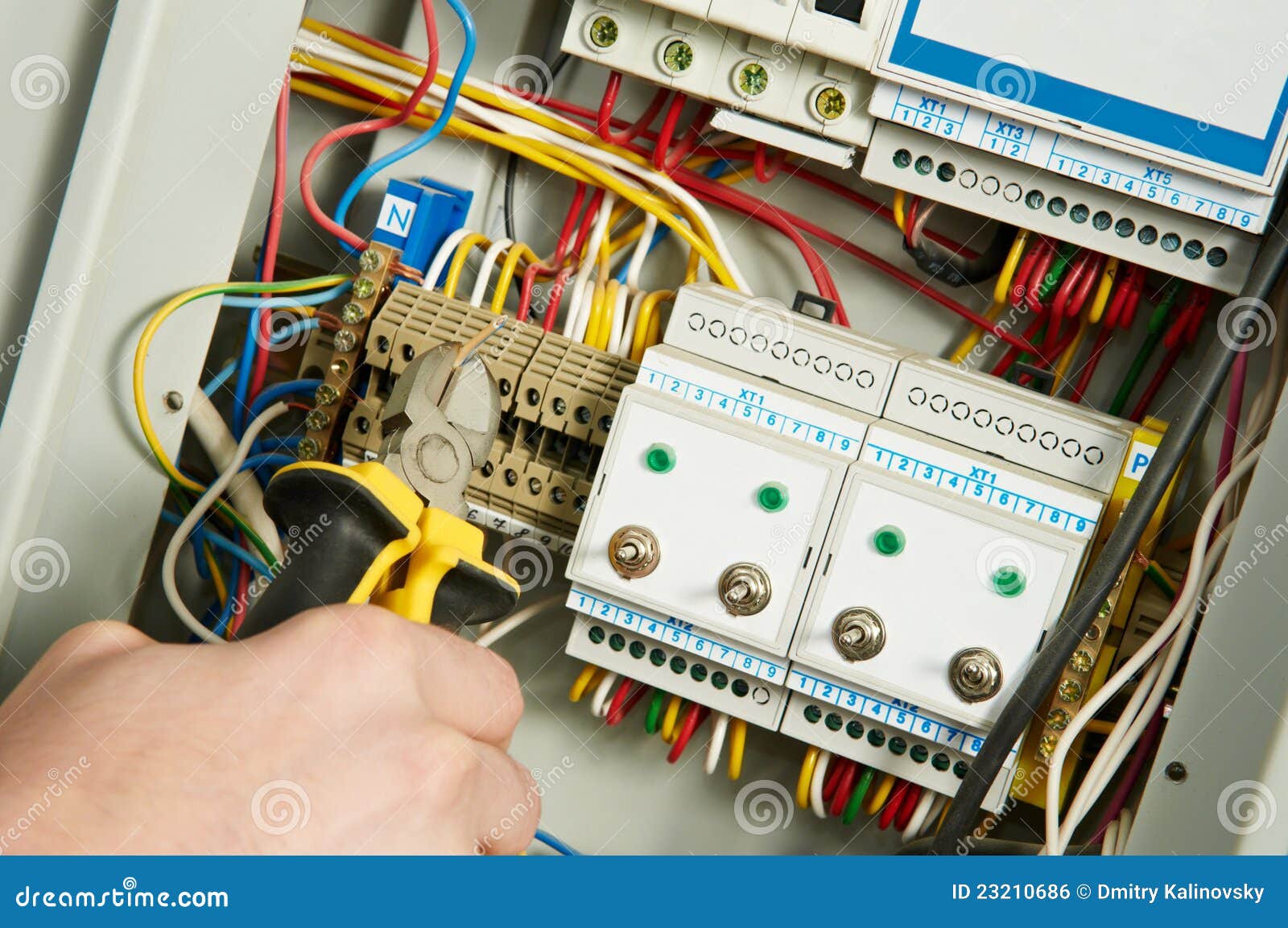 Electrician at work stock photo. Image of mounting, plyers - 23210686