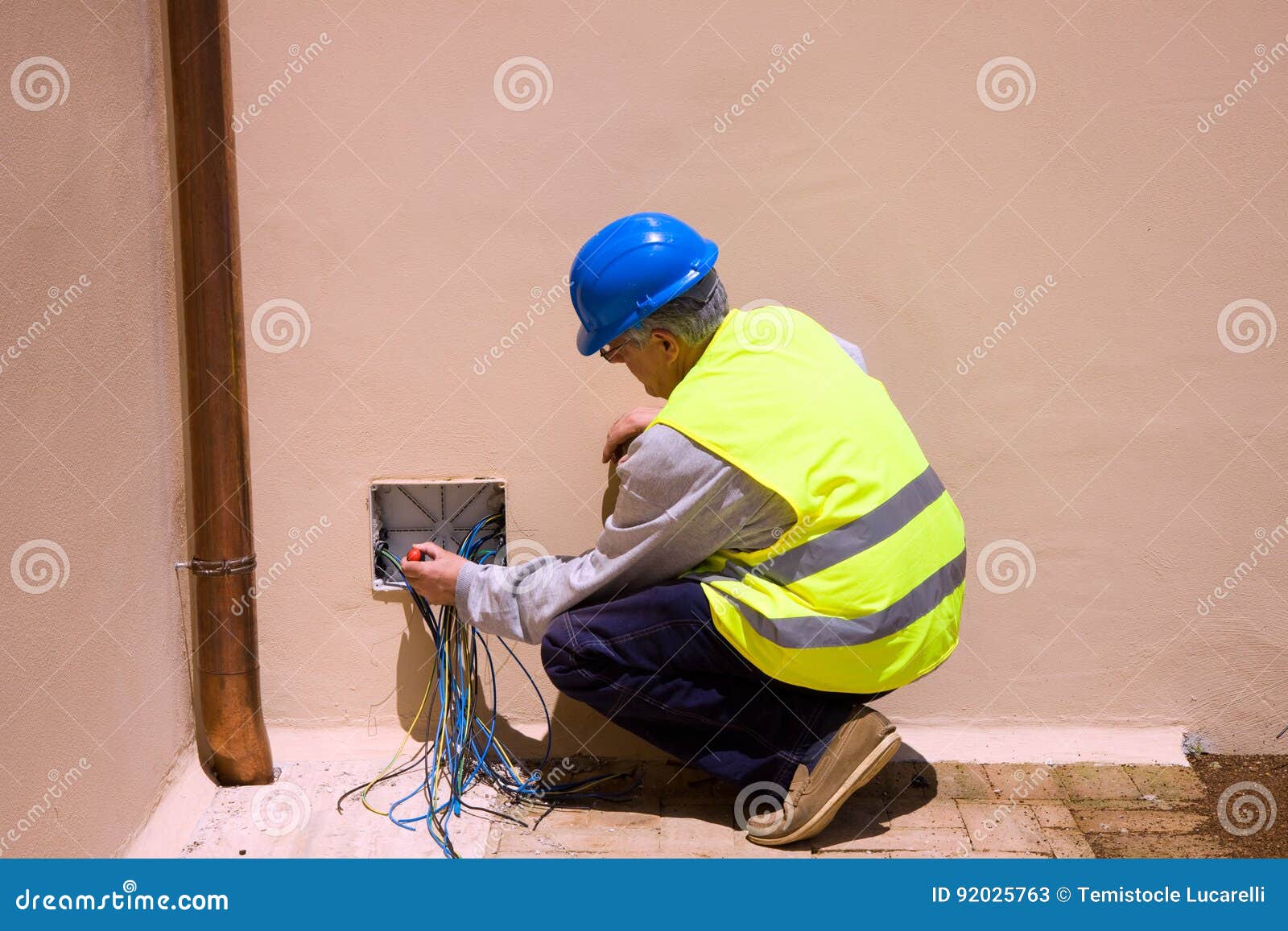 Electrician at work stock image. Image of panel, measure - 92025763