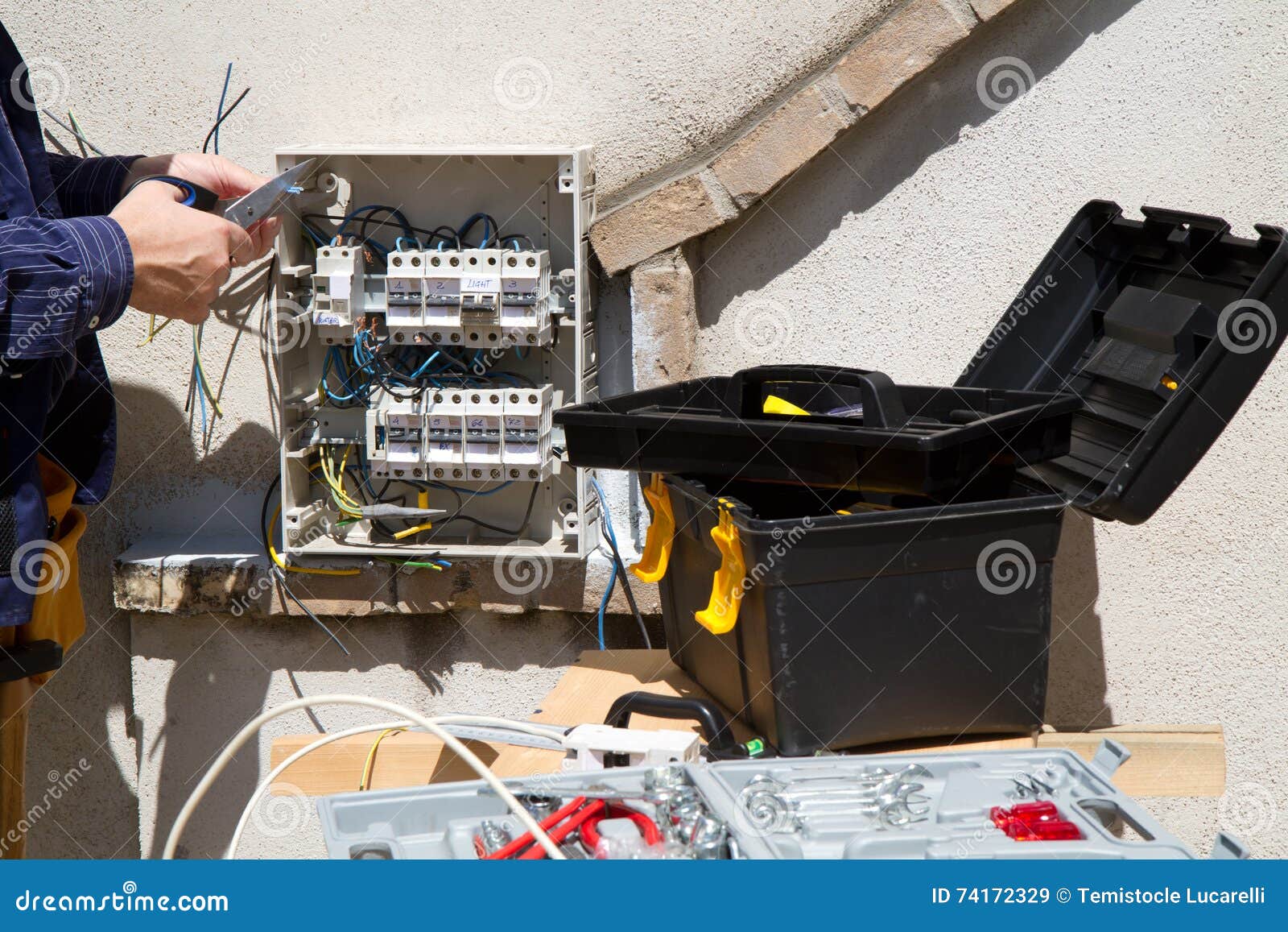 Electrician at work editorial stock image. Image of circuit - 74172329