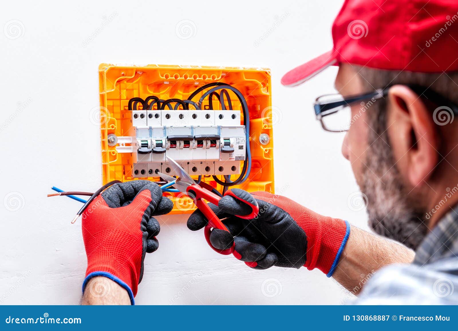 Electrician at Work on an Electrical Panel. Stock Image - Image of ...