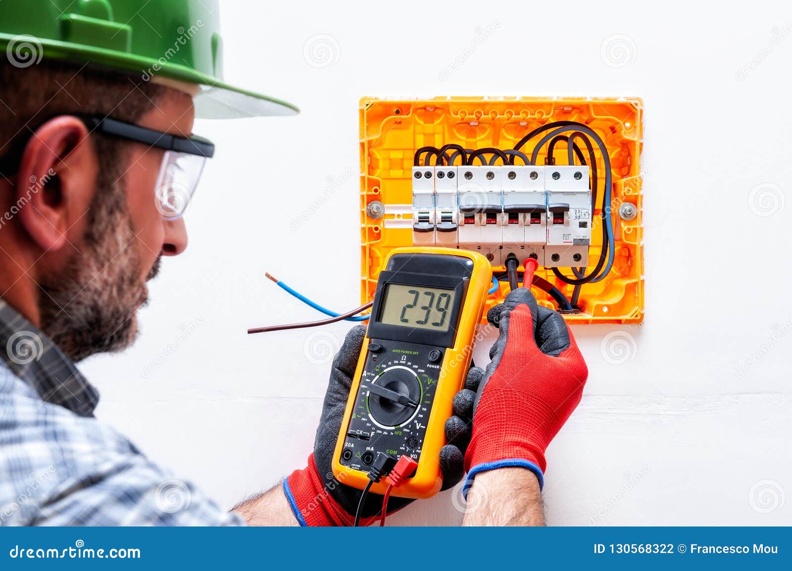 Electrician at Work on an Electrical Panel. Stock Photo - Image of ...
