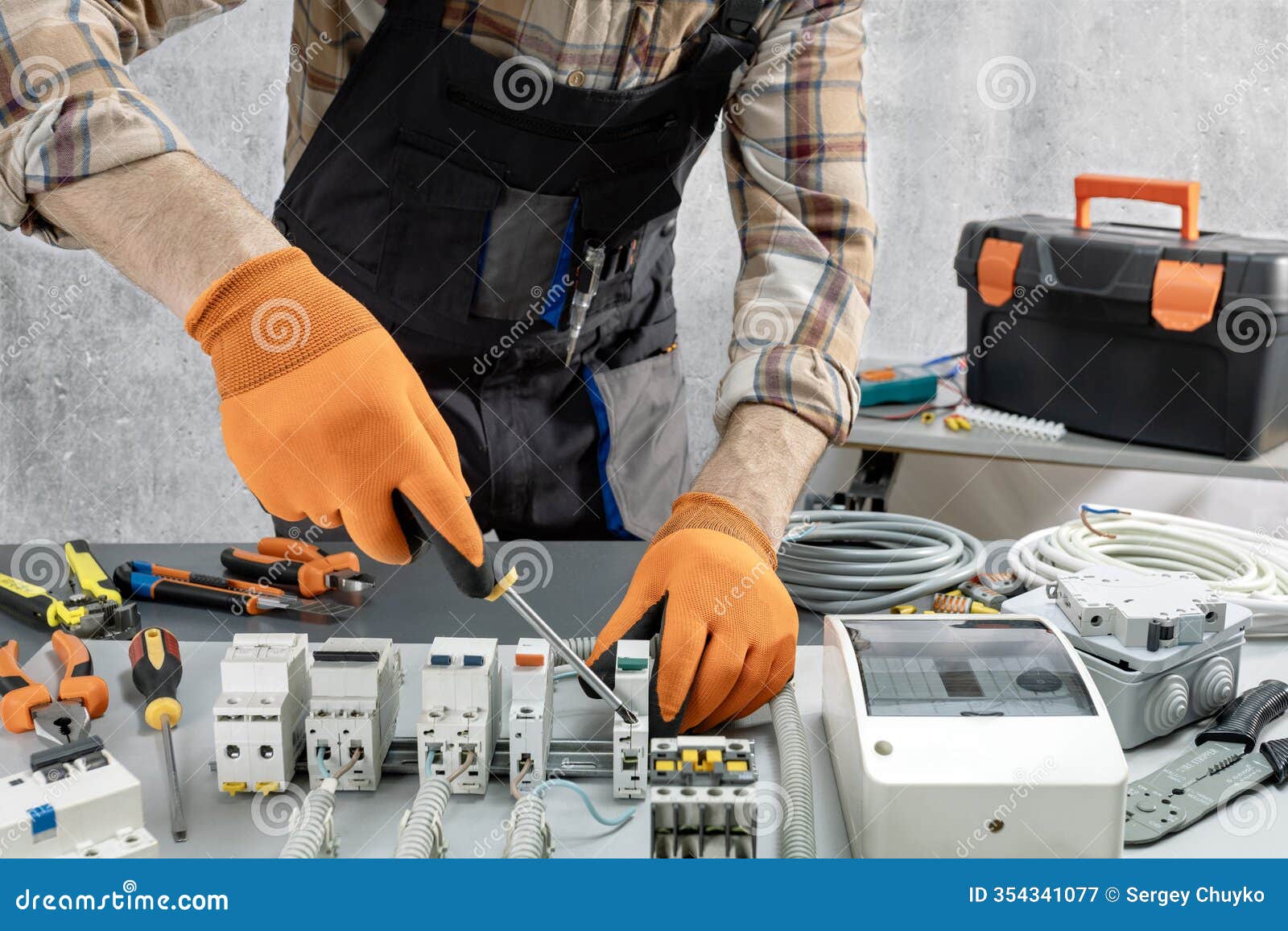 Electrician at work stock image. Image of occupation - 354341077