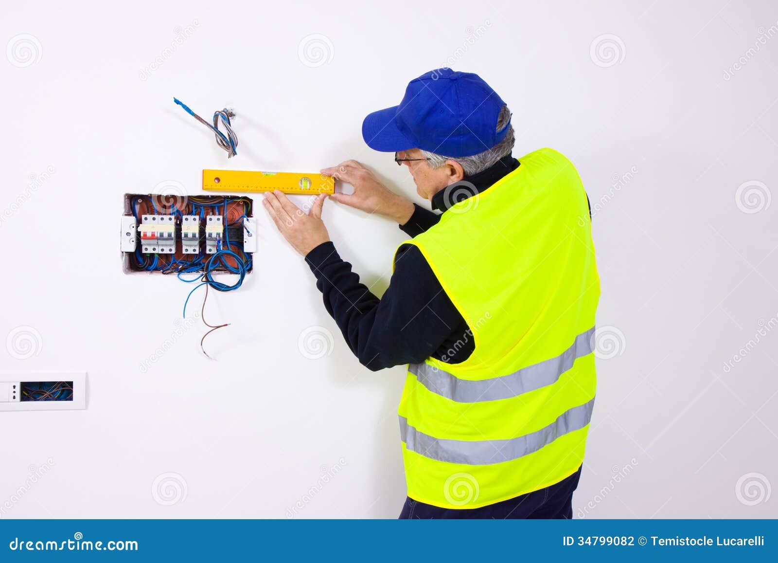 Electrician at work stock photo. Image of installation - 34799082