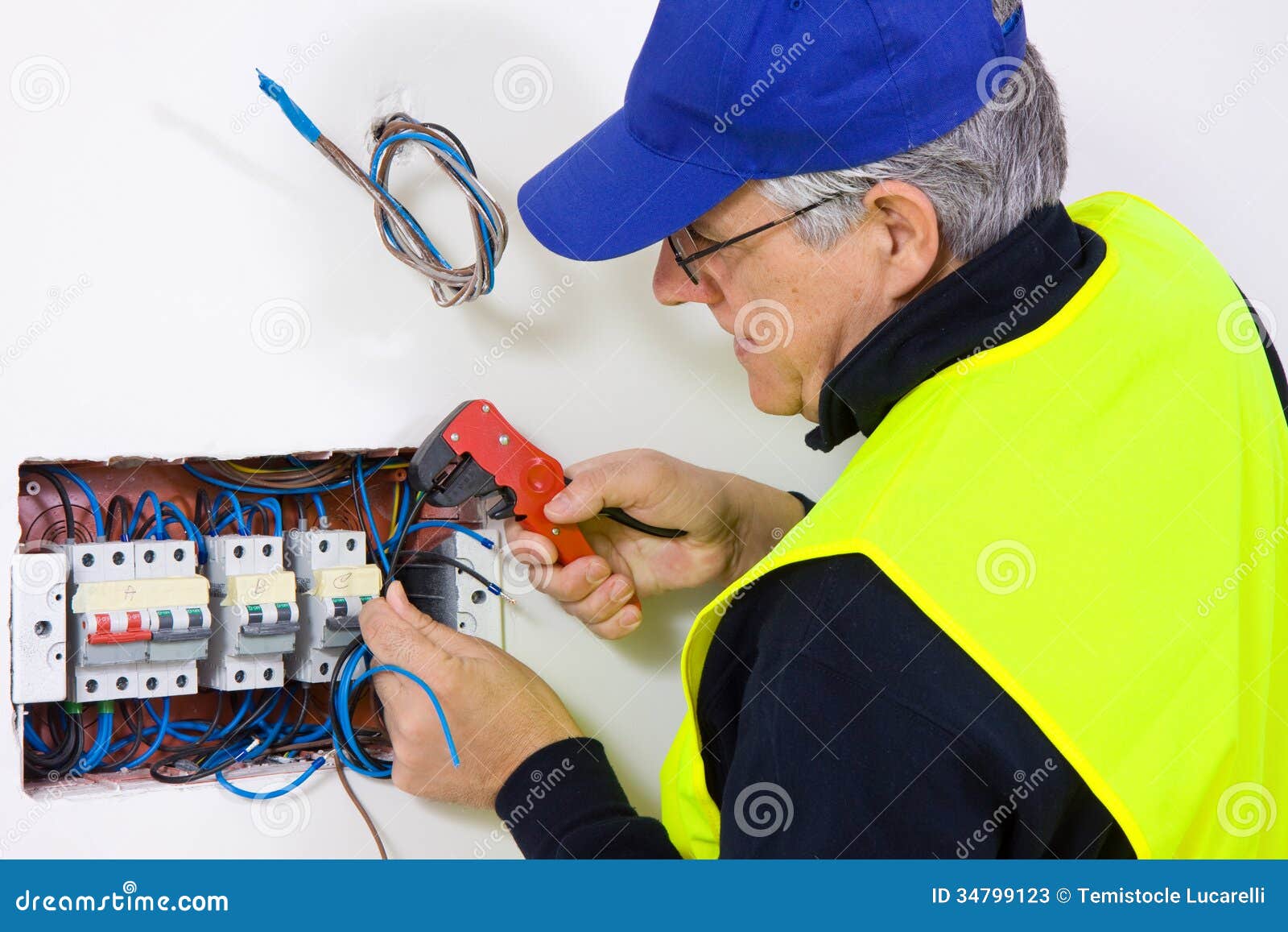 Electrician at work stock image. Image of measure, electric - 34799123