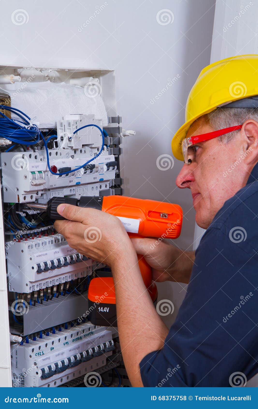Electrician at work stock photo. Image of plant, electric - 68375758