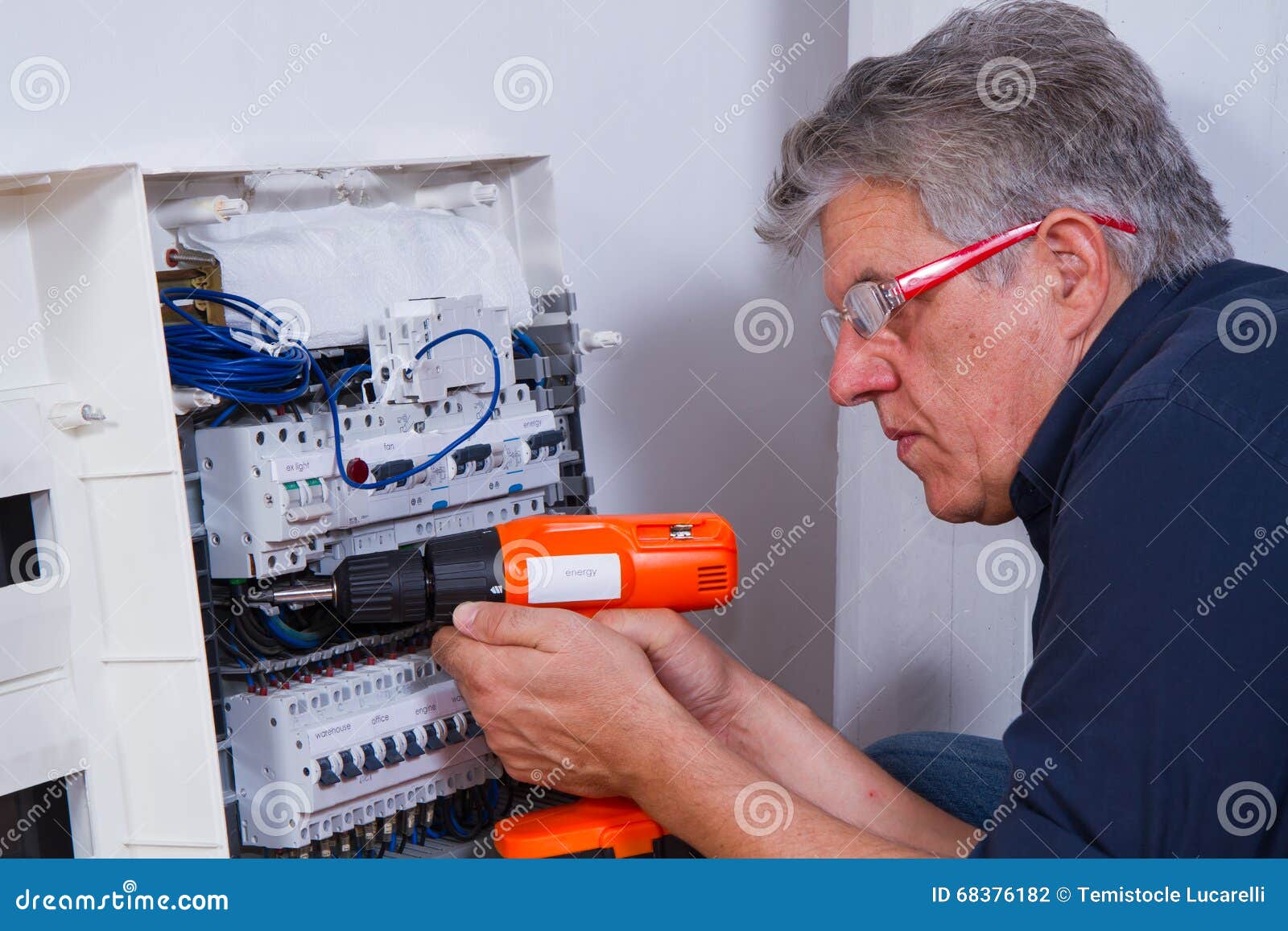 Electrician at work stock photo. Image of laborer, assembling - 68376182
