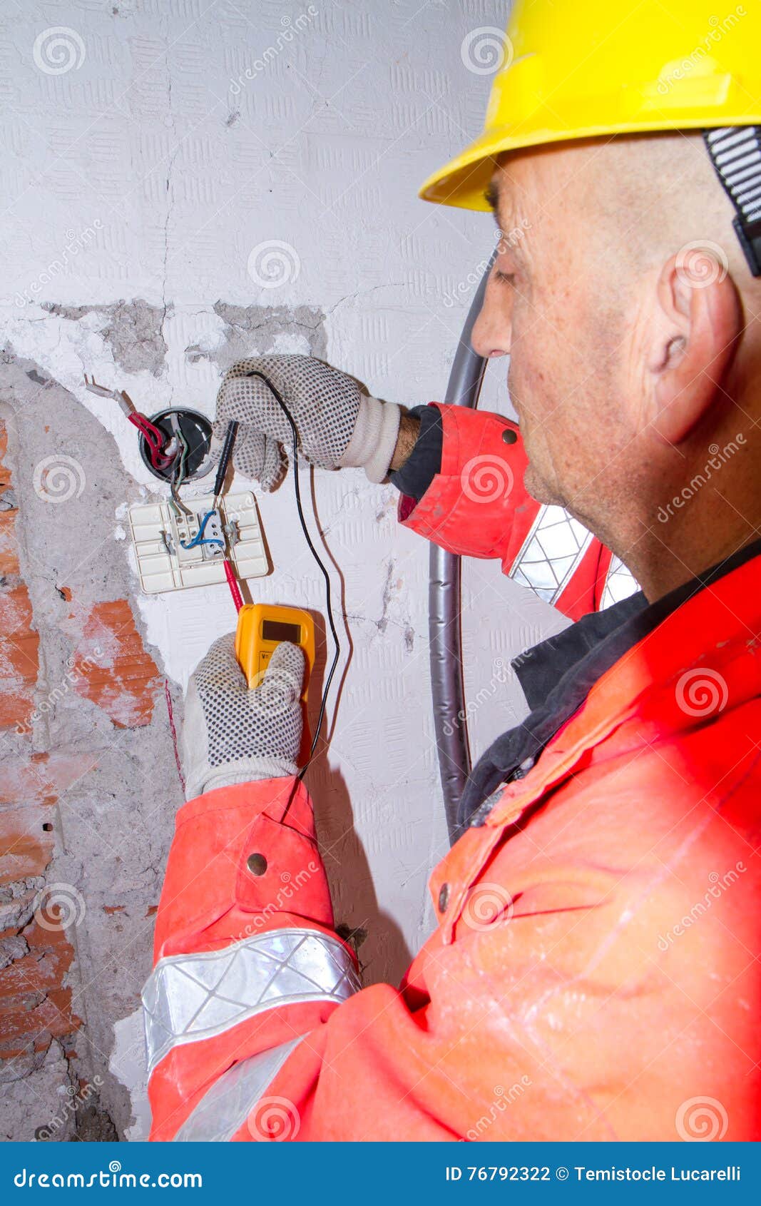 Electrician at work stock photo. Image of maintenance - 76792322