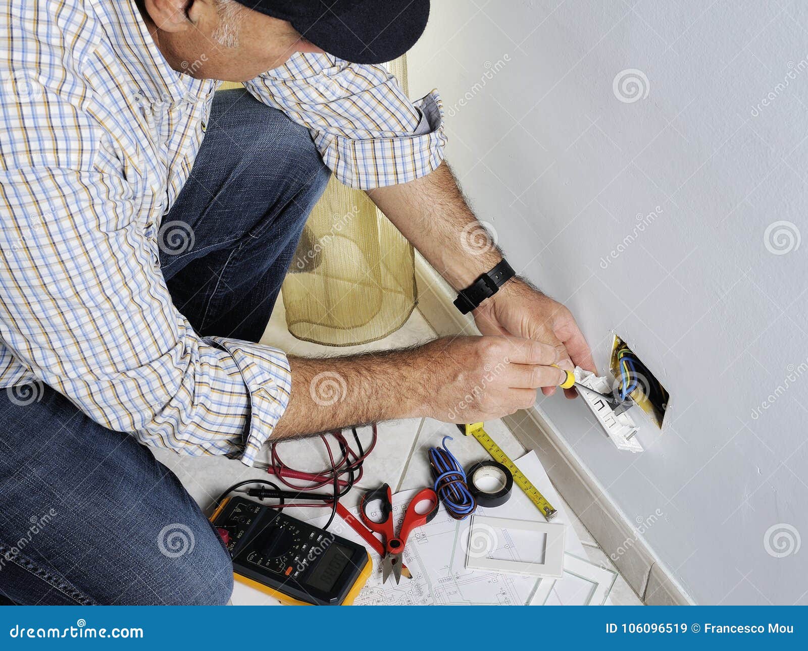 Electrician Working in a Residential Electrical System Stock Image ...