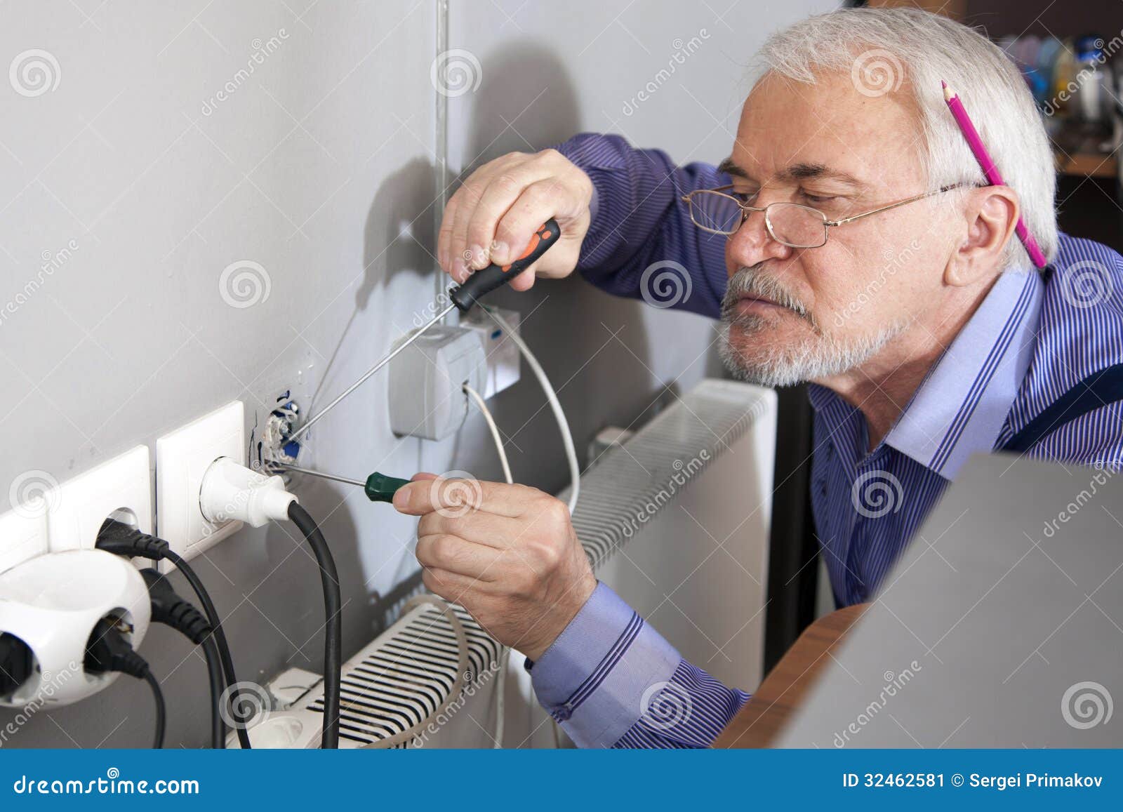 Electrician at work stock image. Image of scewdriver - 32462581