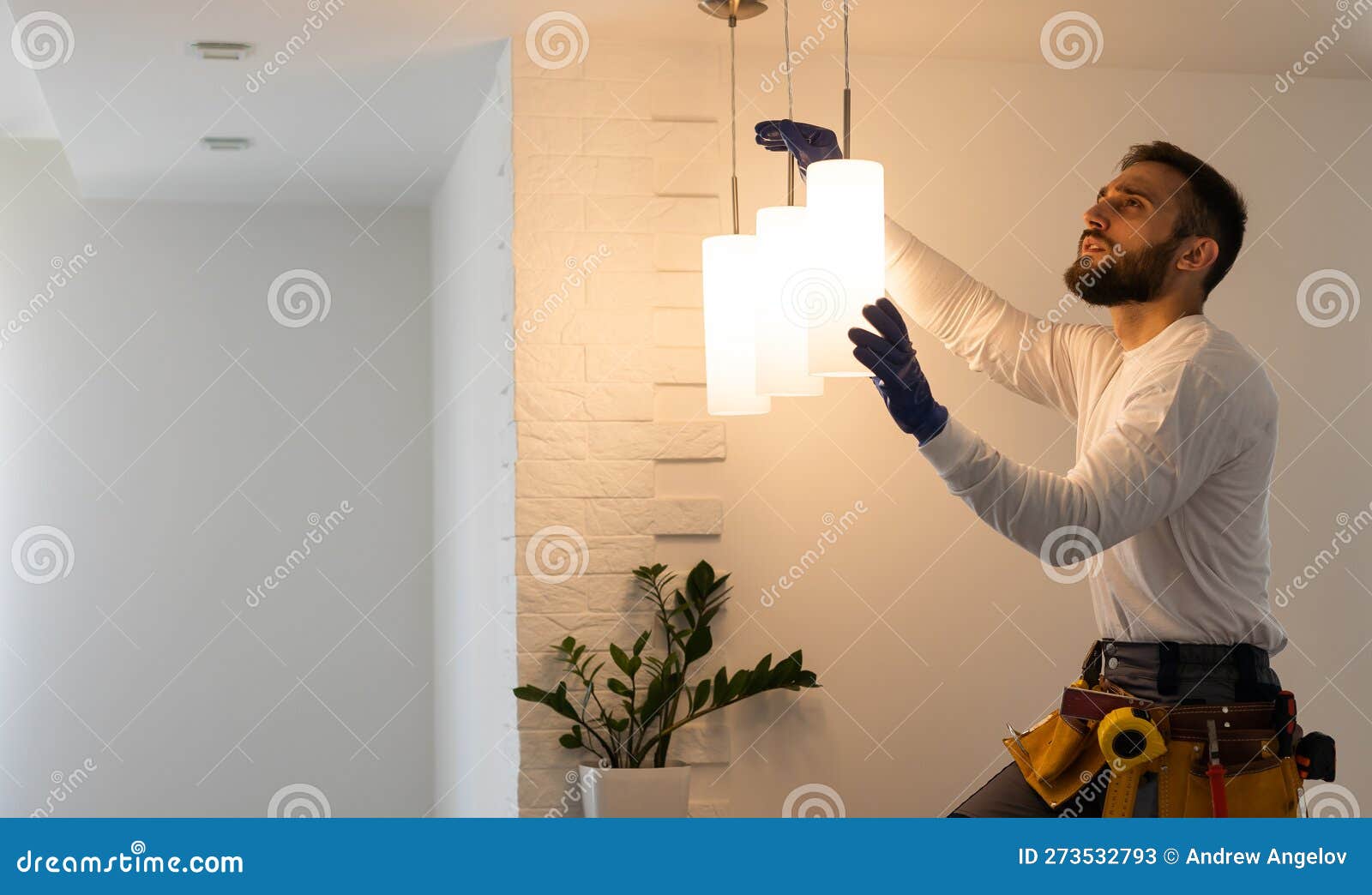 Electrician Worker Man Assembling Electric Lamps in New Apartment ...