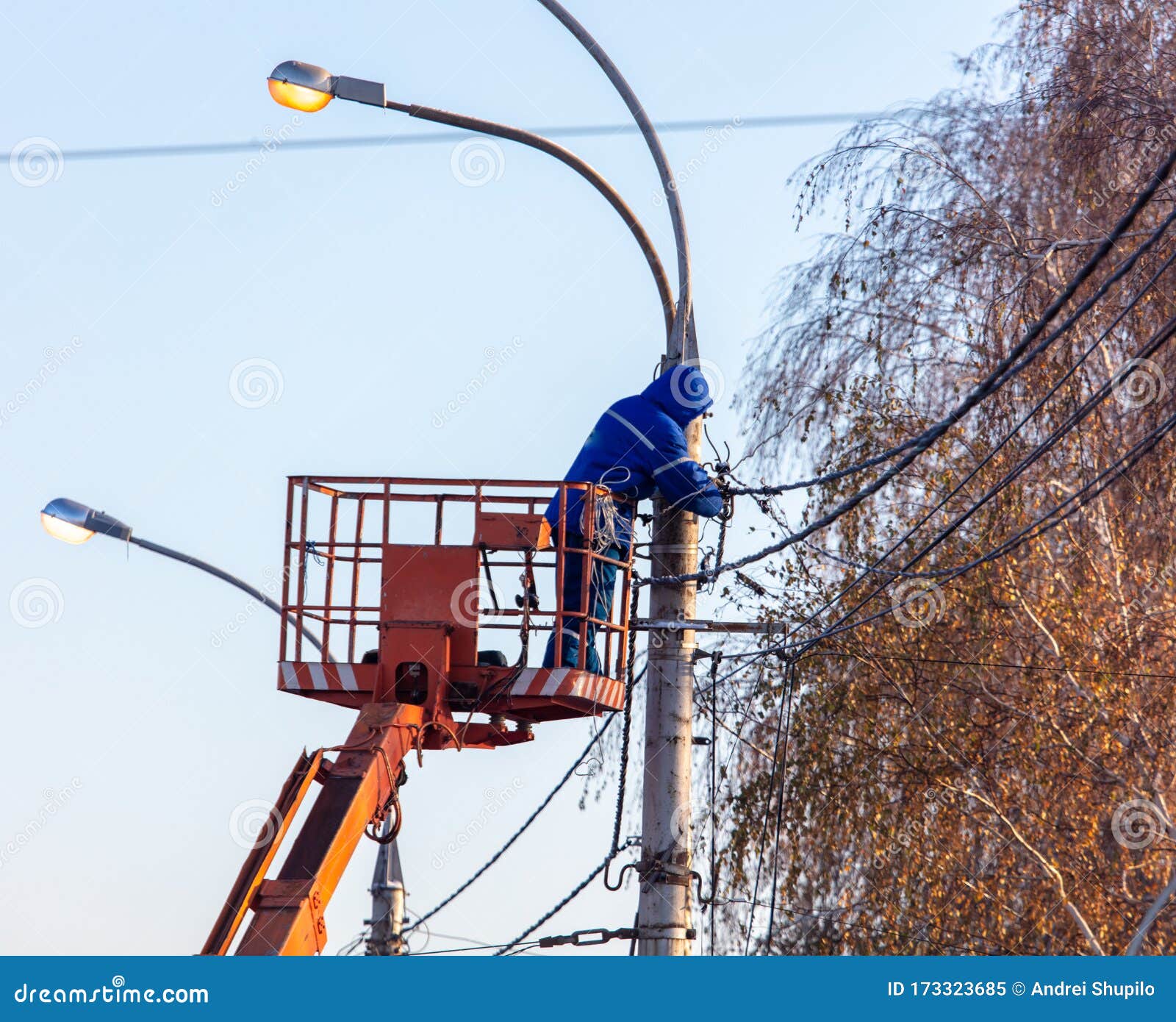 An Electrician is Working on a Pole Stock Image - Image of power ...