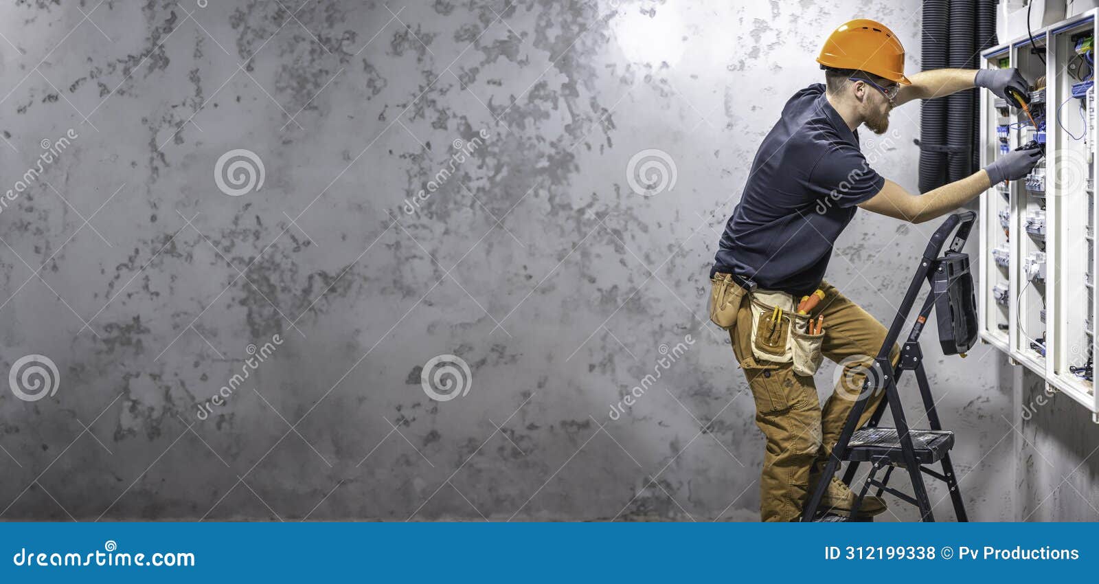Electrician Working in Switchboard with Electrical Connection Cable ...