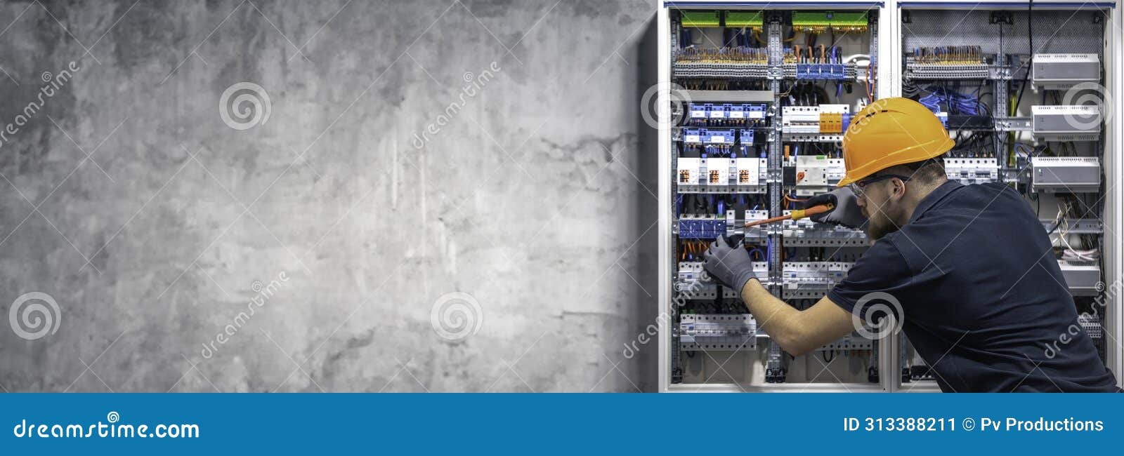 Electrician Working in Switchboard with Electrical Connection Cable ...